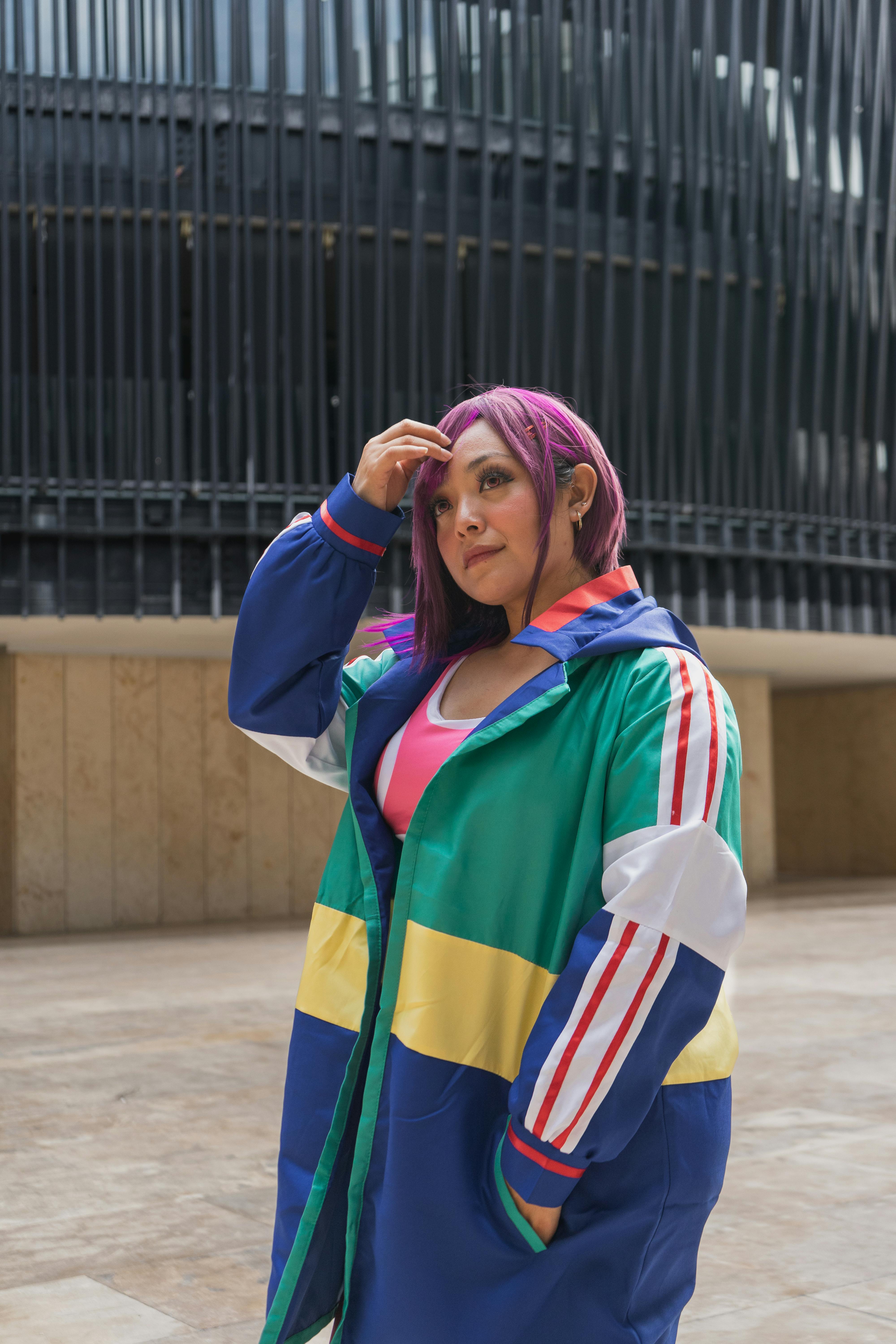 Woman Wearing Colorful Tracksuit on a Square · Free Stock Photo