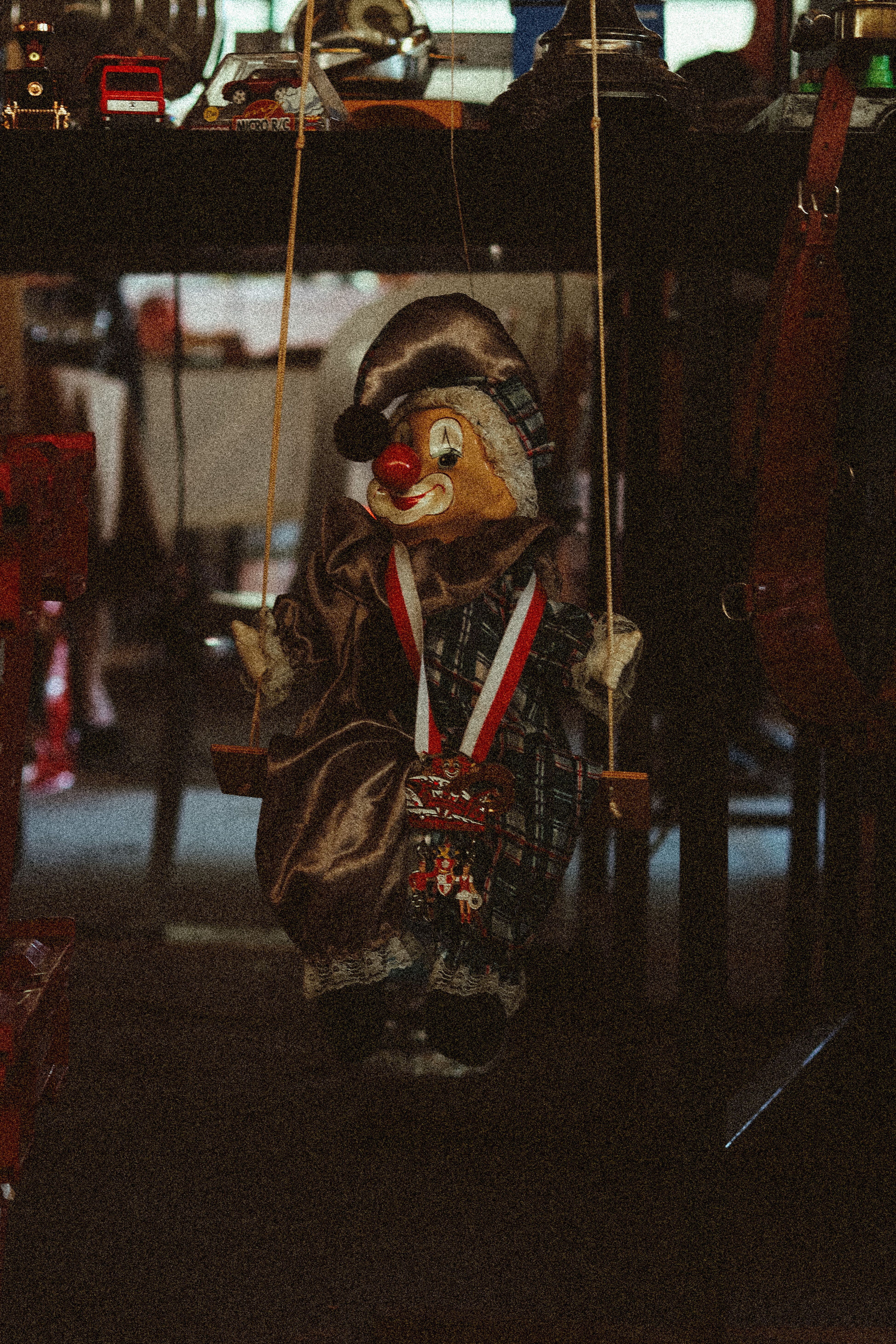 Figurine of a Clown on a Swing · Free Stock Photo
