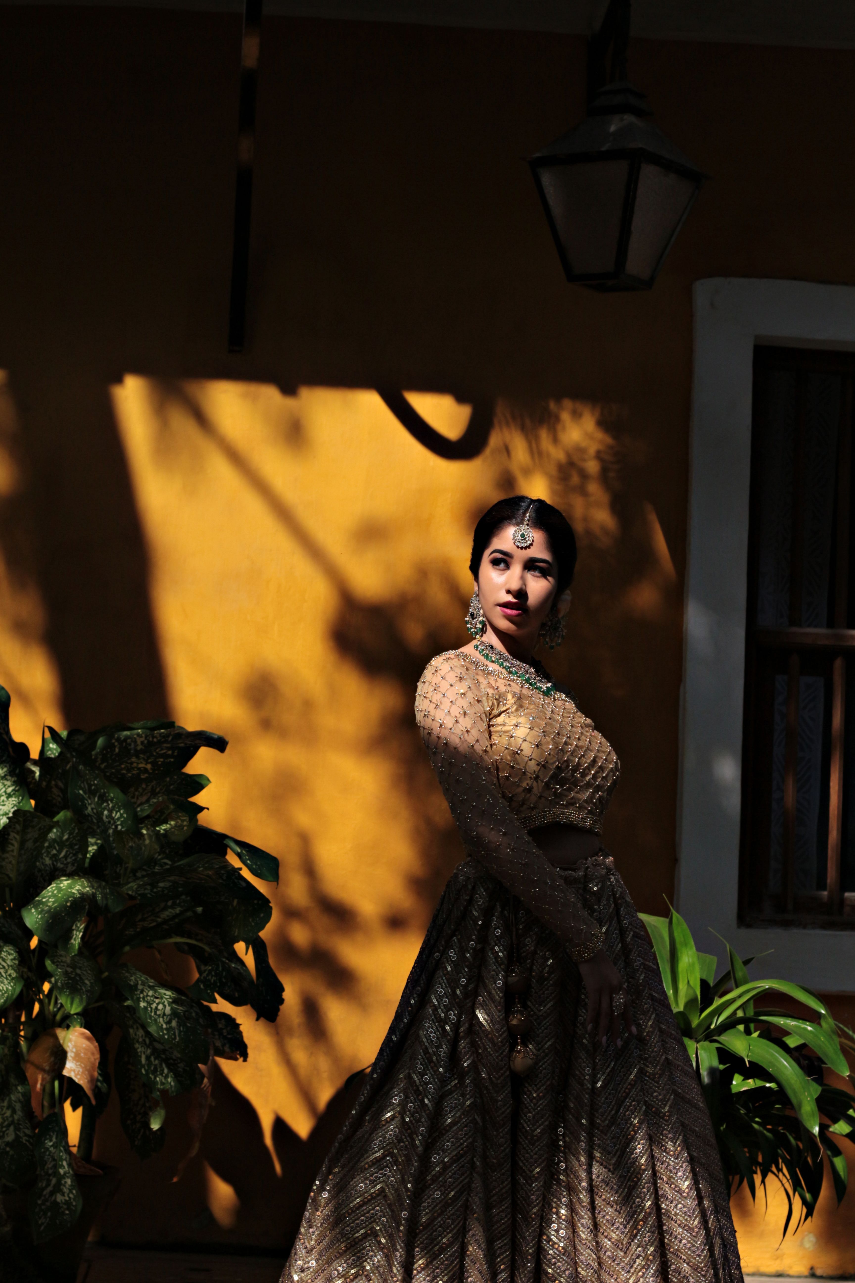 Woman in Traditional Dress in Shadow · Free Stock Photo