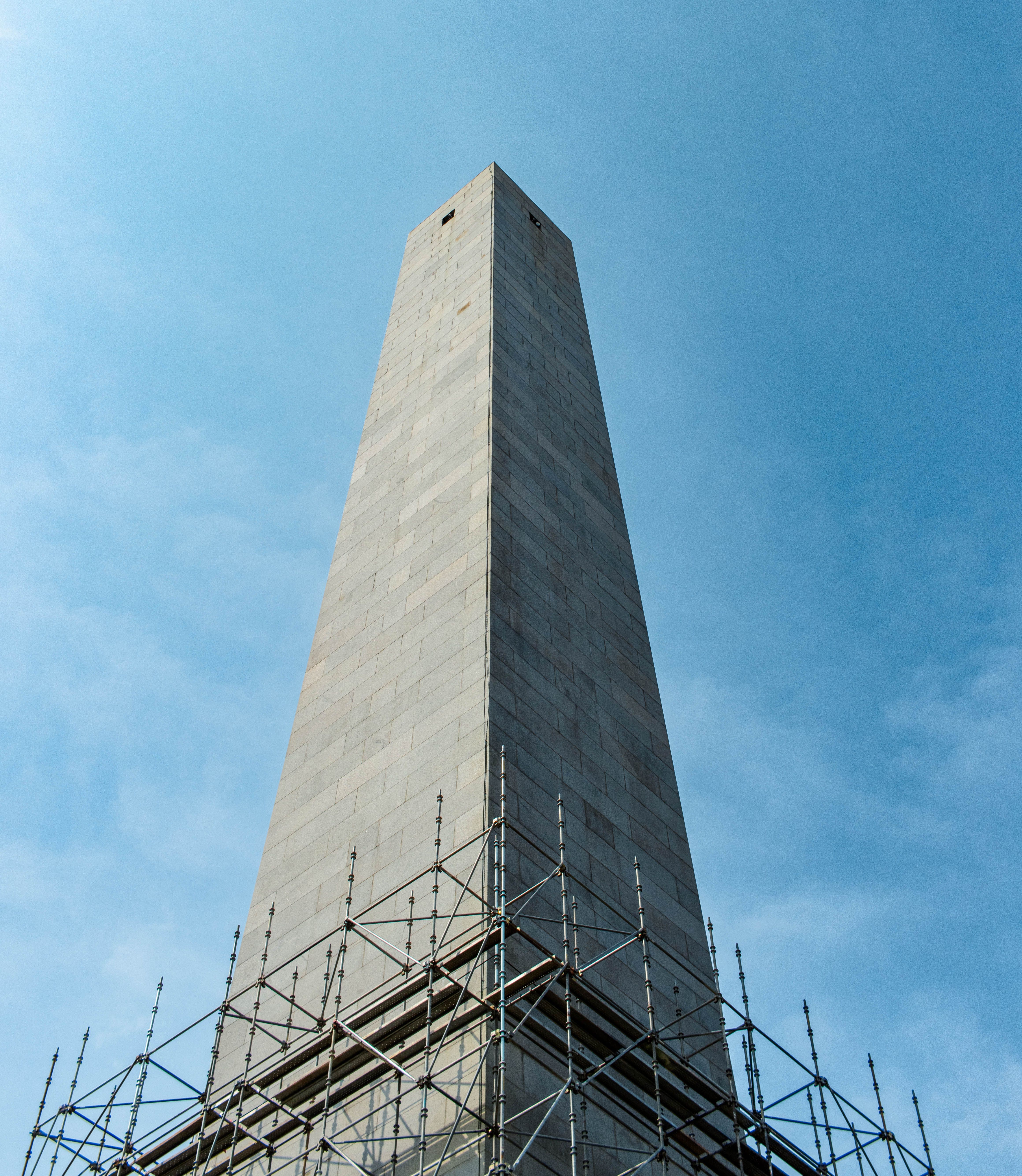 Low Angle Shot of an Obelisk with Scaffolding · Free Stock Photo