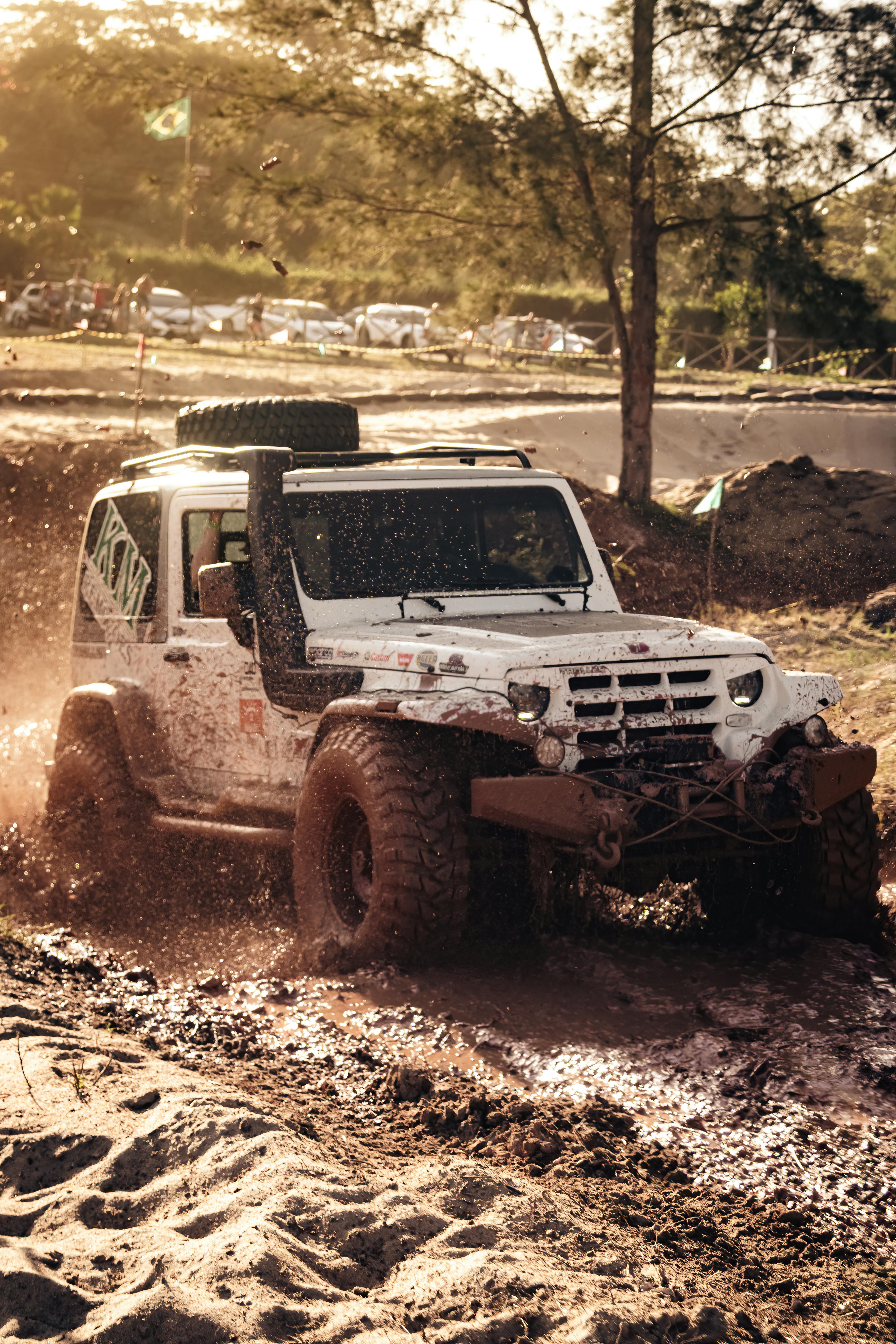 An Off Road Car Diving in Mud · Free Stock Photo