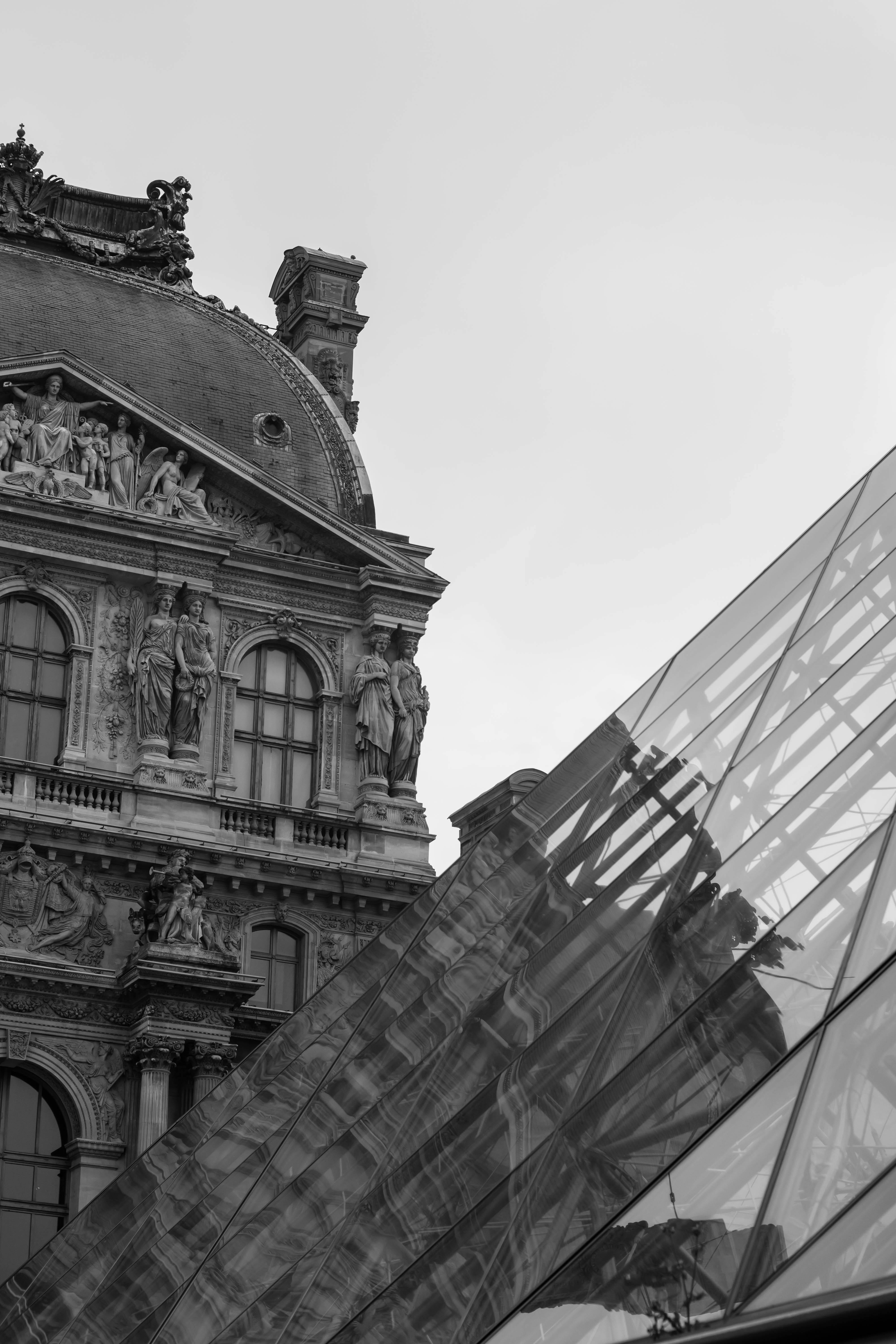 Louvre Pyramid and Historic Architecture in Paris · Free Stock Photo