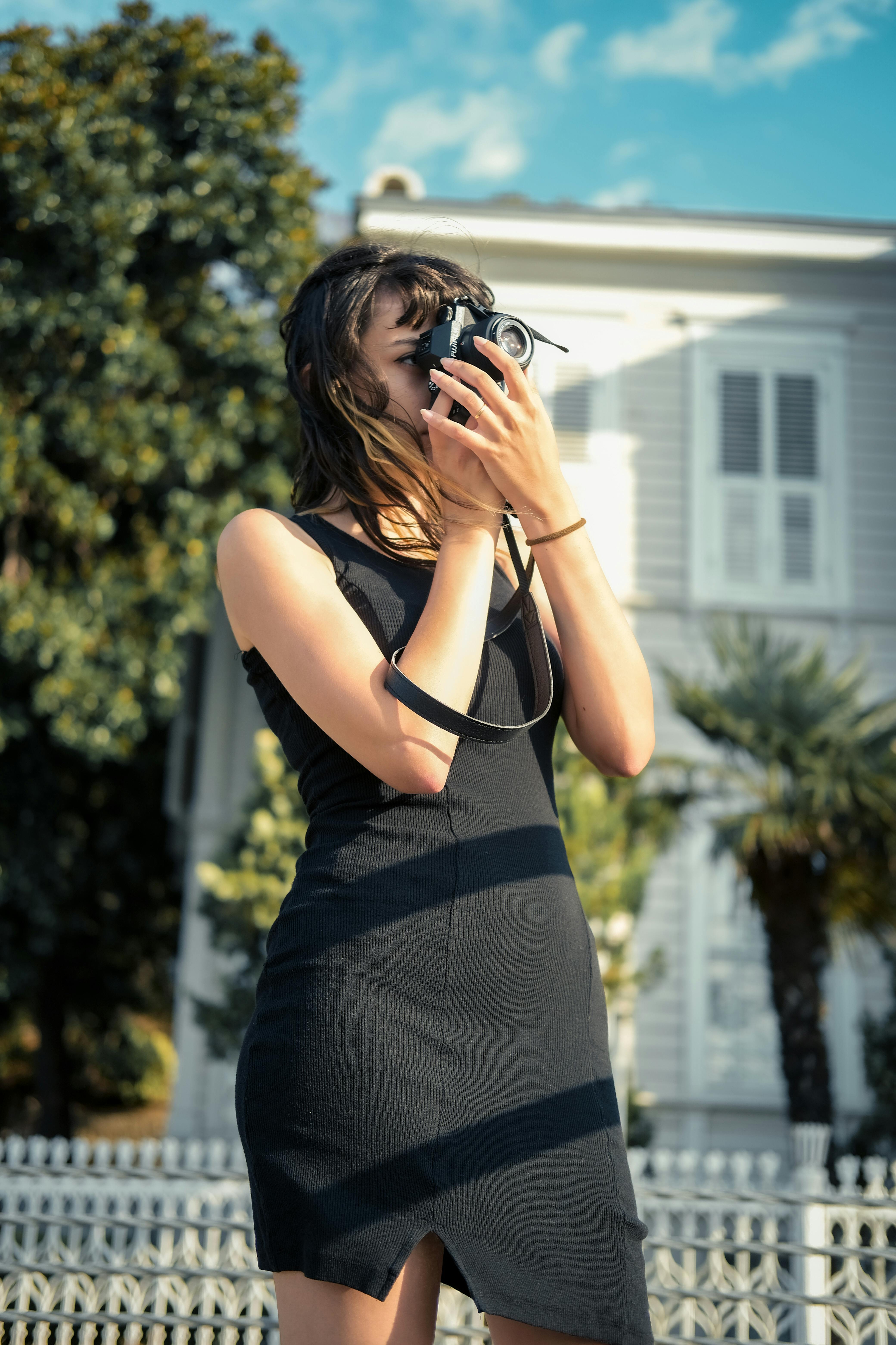 Woman Bodycone Dress Photographing · Free Stock Photo