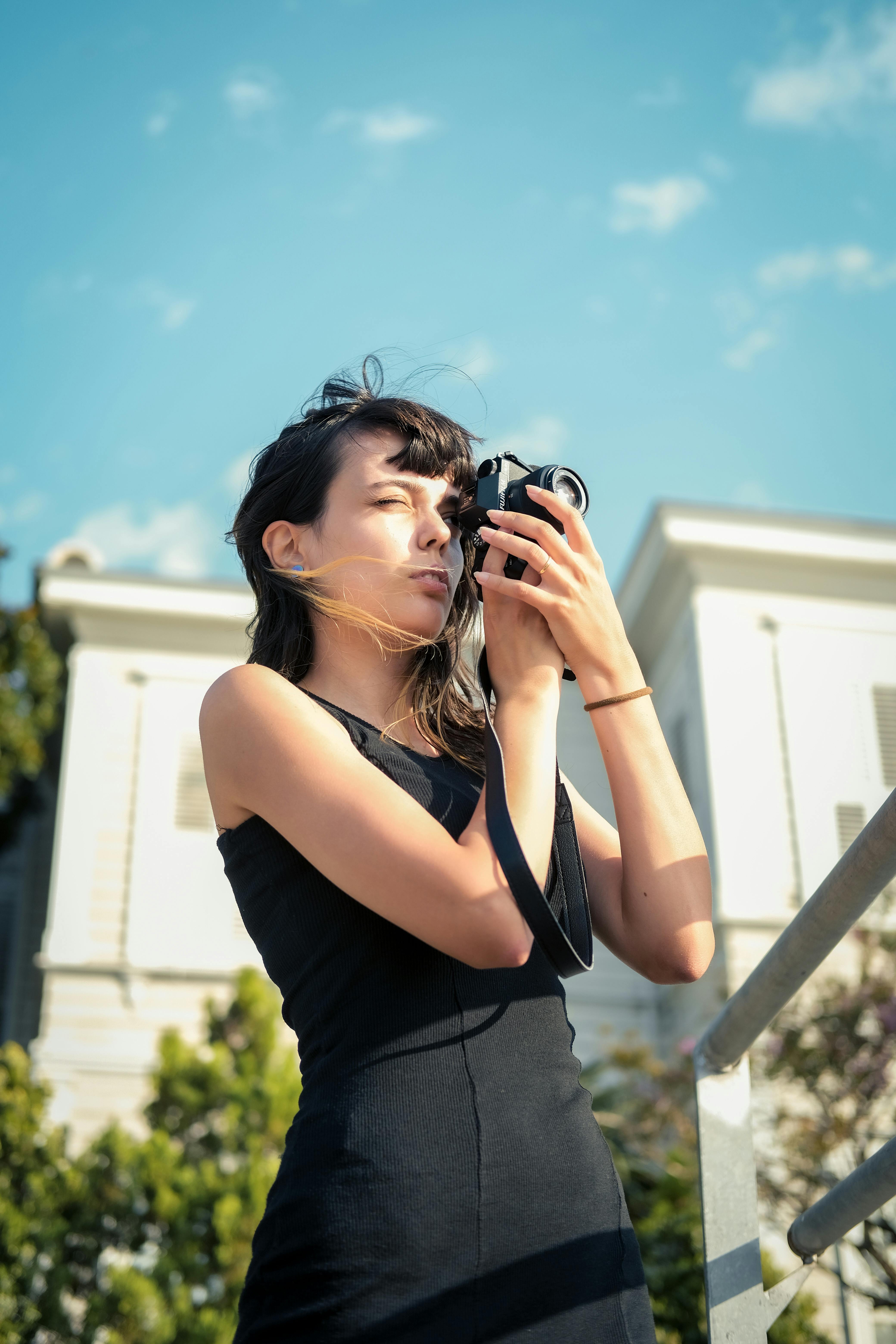 Woman Bodycone Dress Photographing · Free Stock Photo