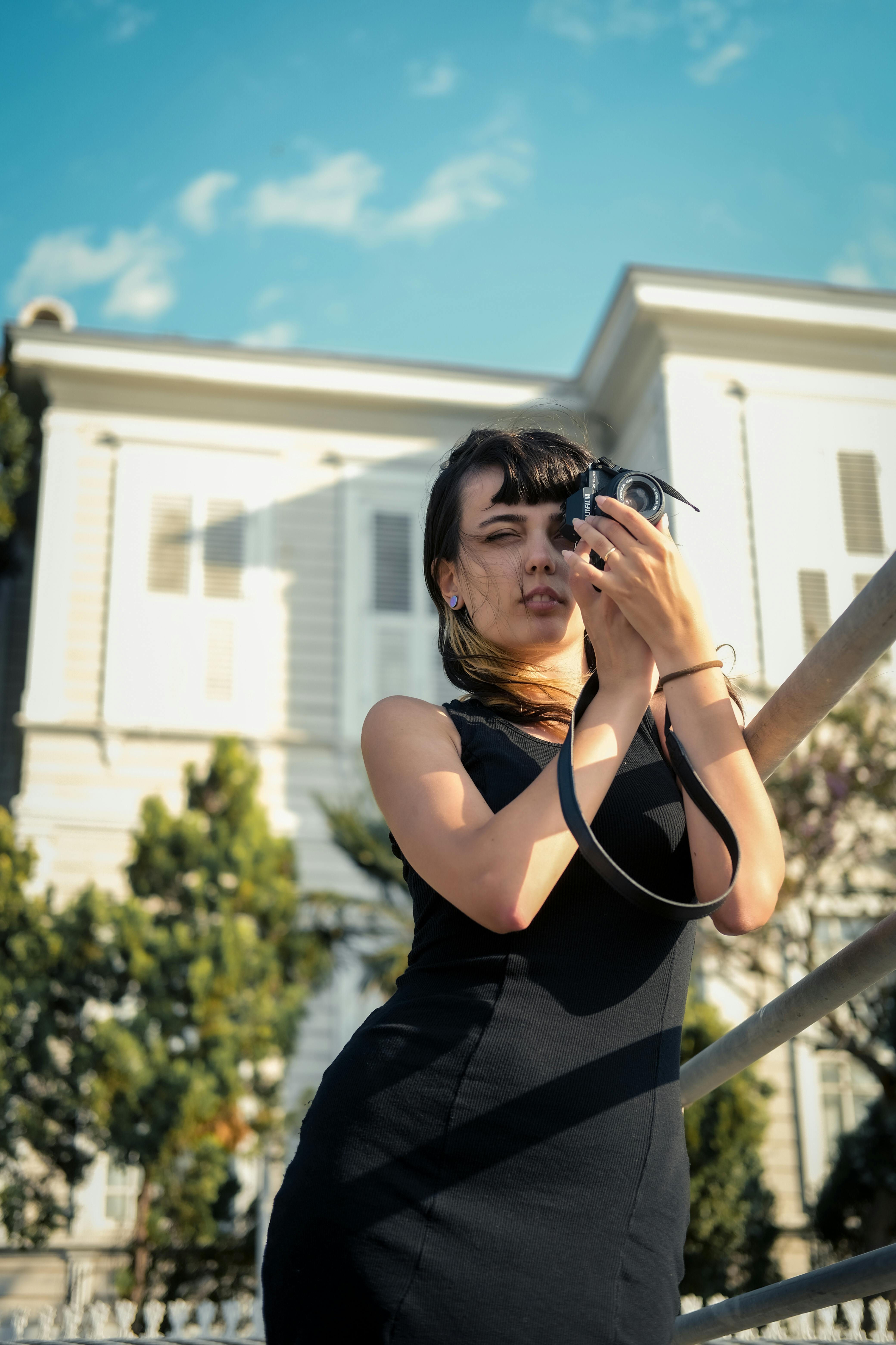 Woman Bodycone Dress Photographing · Free Stock Photo