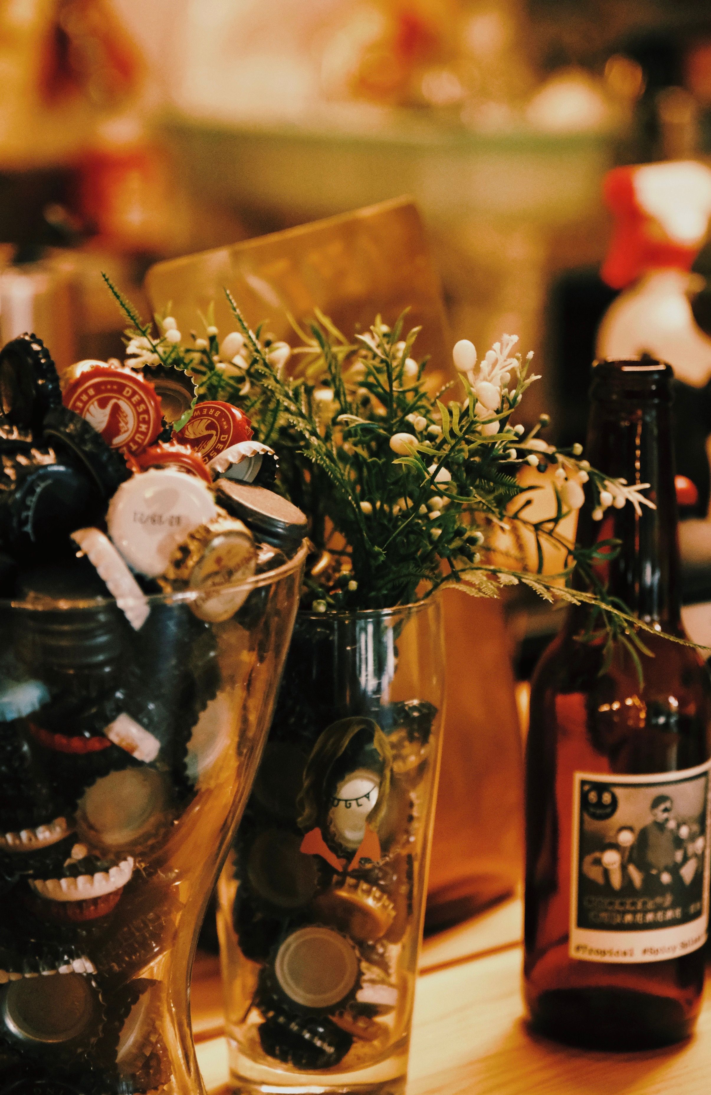 Glass Vases Full of Bottle Caps · Free Stock Photo