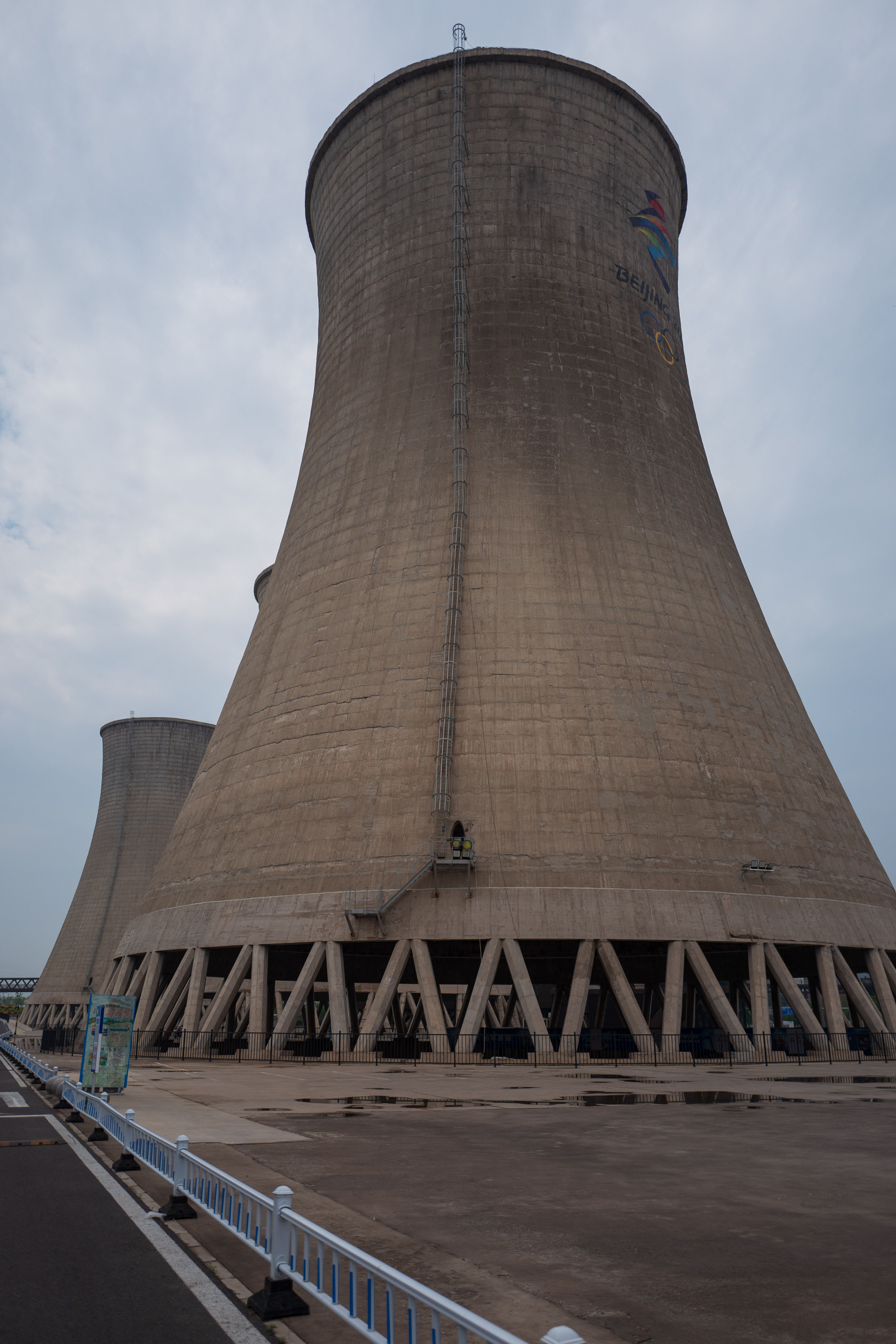 Cooling Towers Reflected on Calm Lake · Free Stock Photo