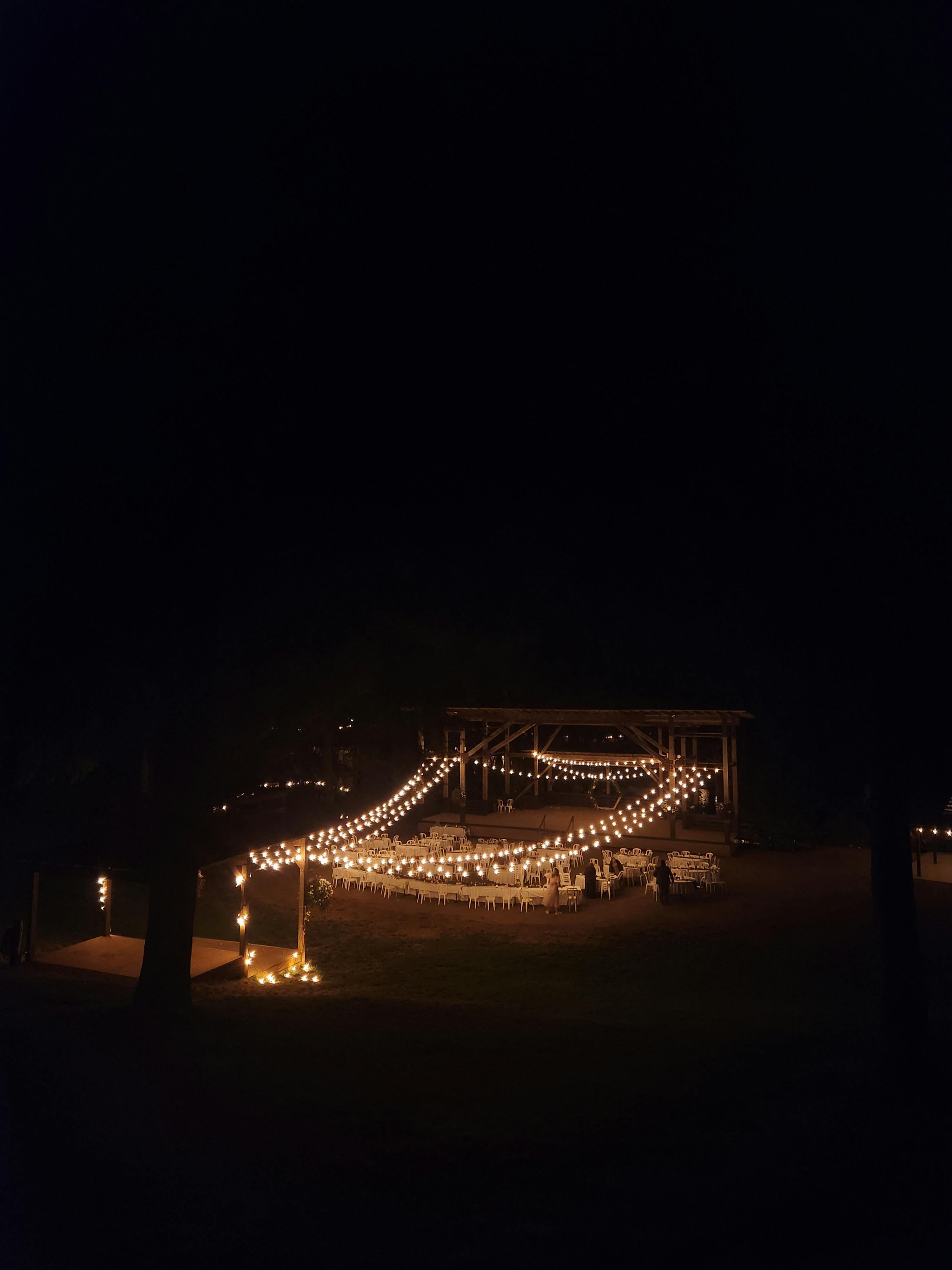 Illuminated Tables and an Open Air Stage · Free Stock Photo