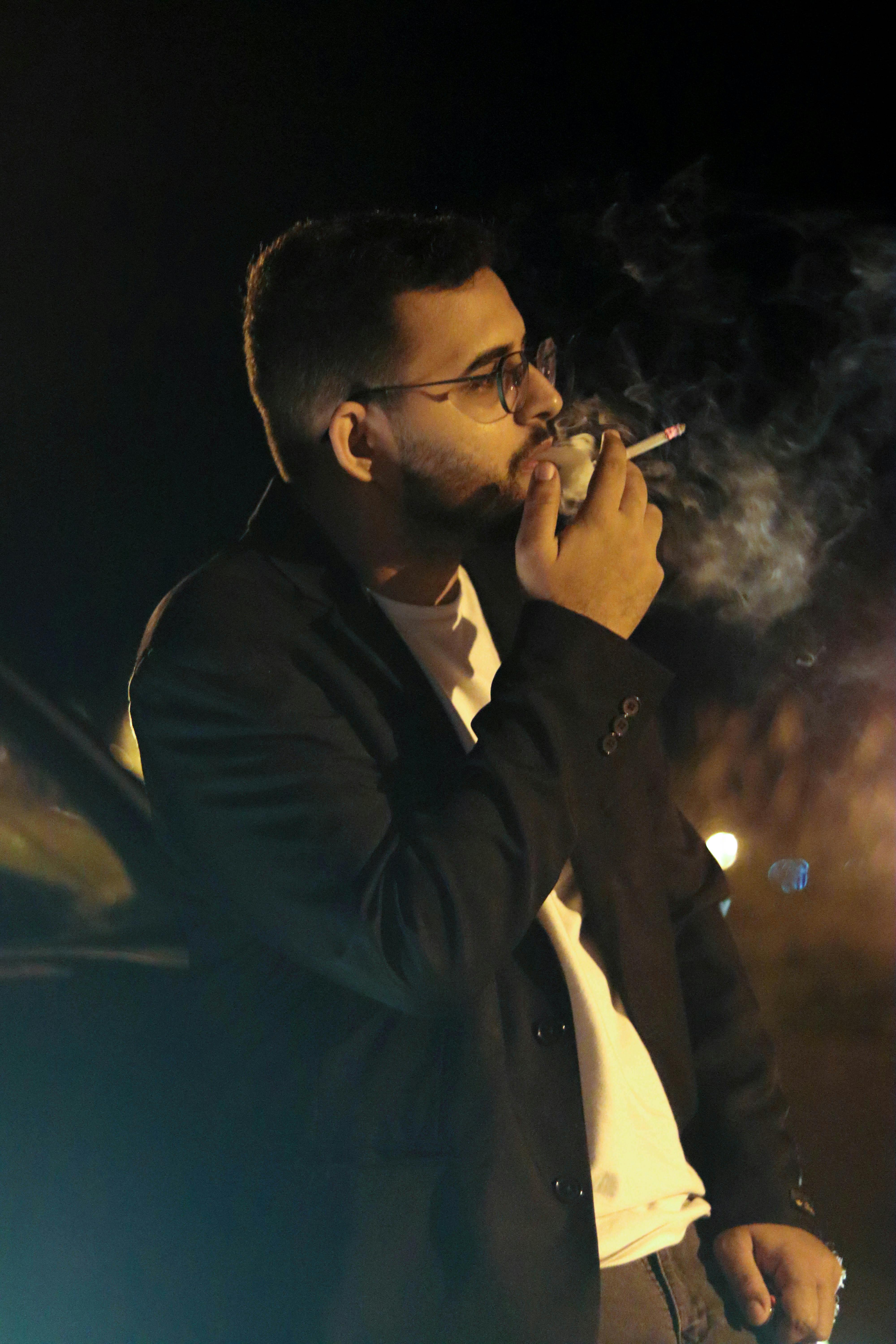 Man Smoking Cigarette at Night · Free Stock Photo