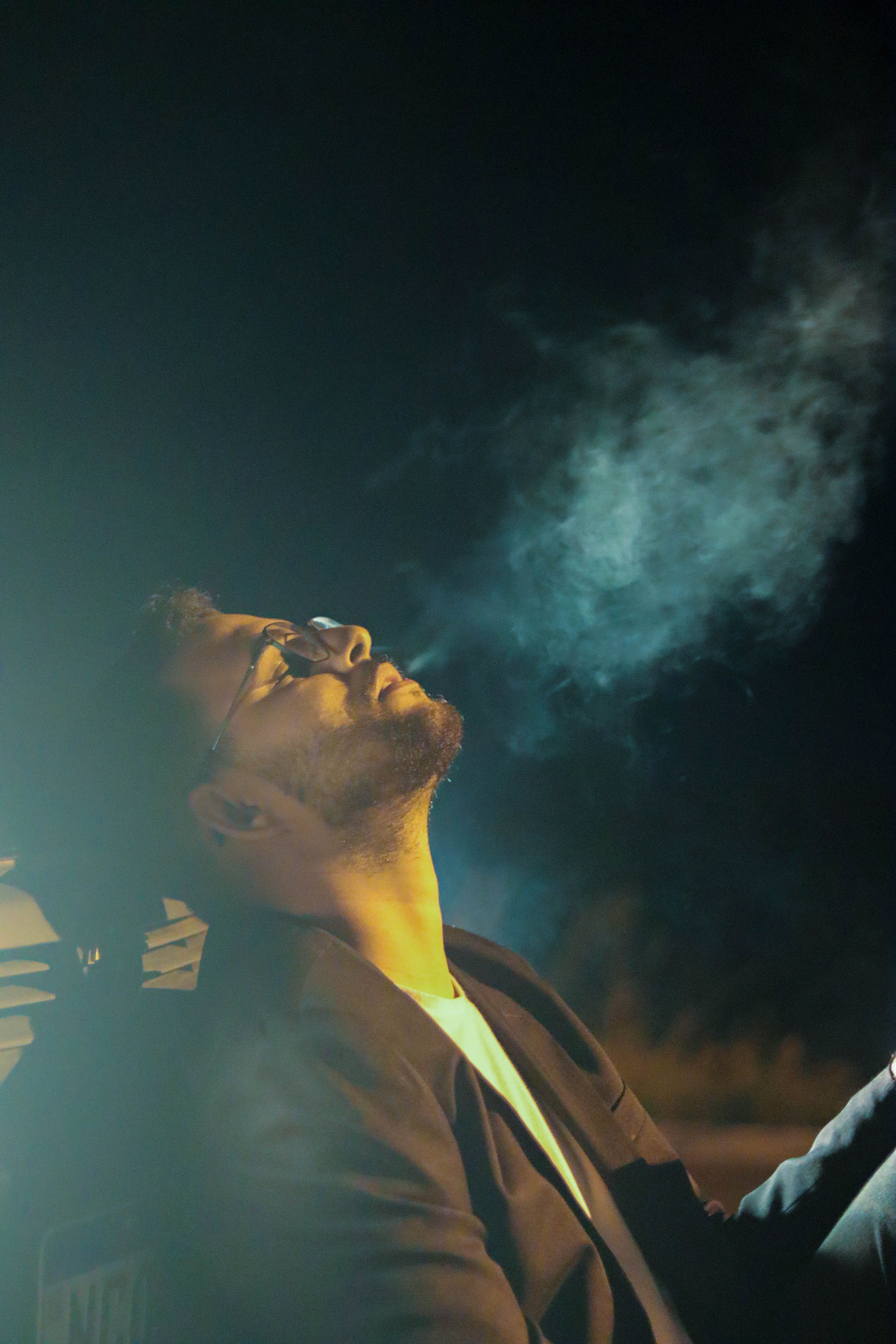 Man Smoking Cigarette at Night · Free Stock Photo