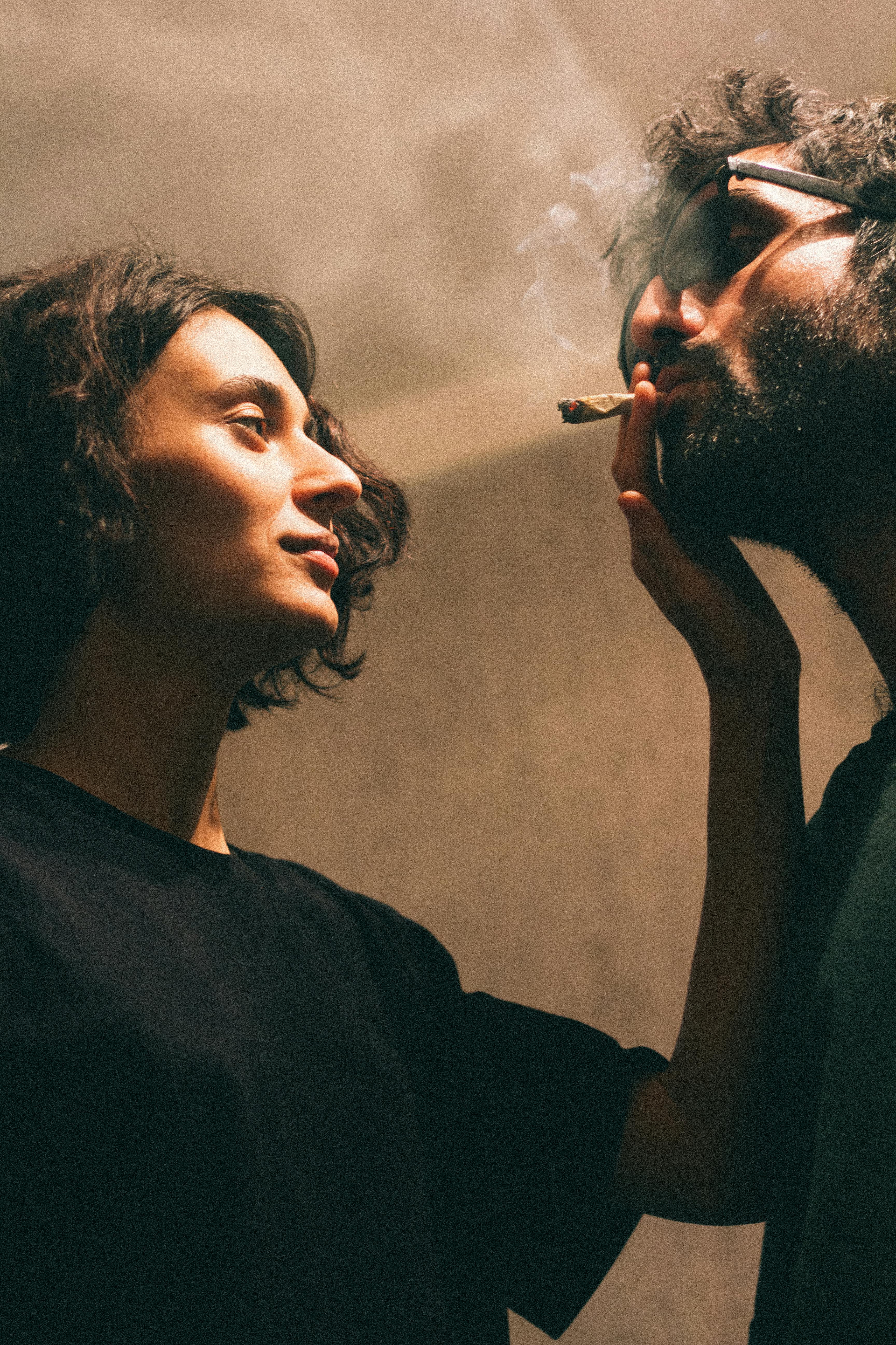 Two People Smoking Together · Free Stock Photo
