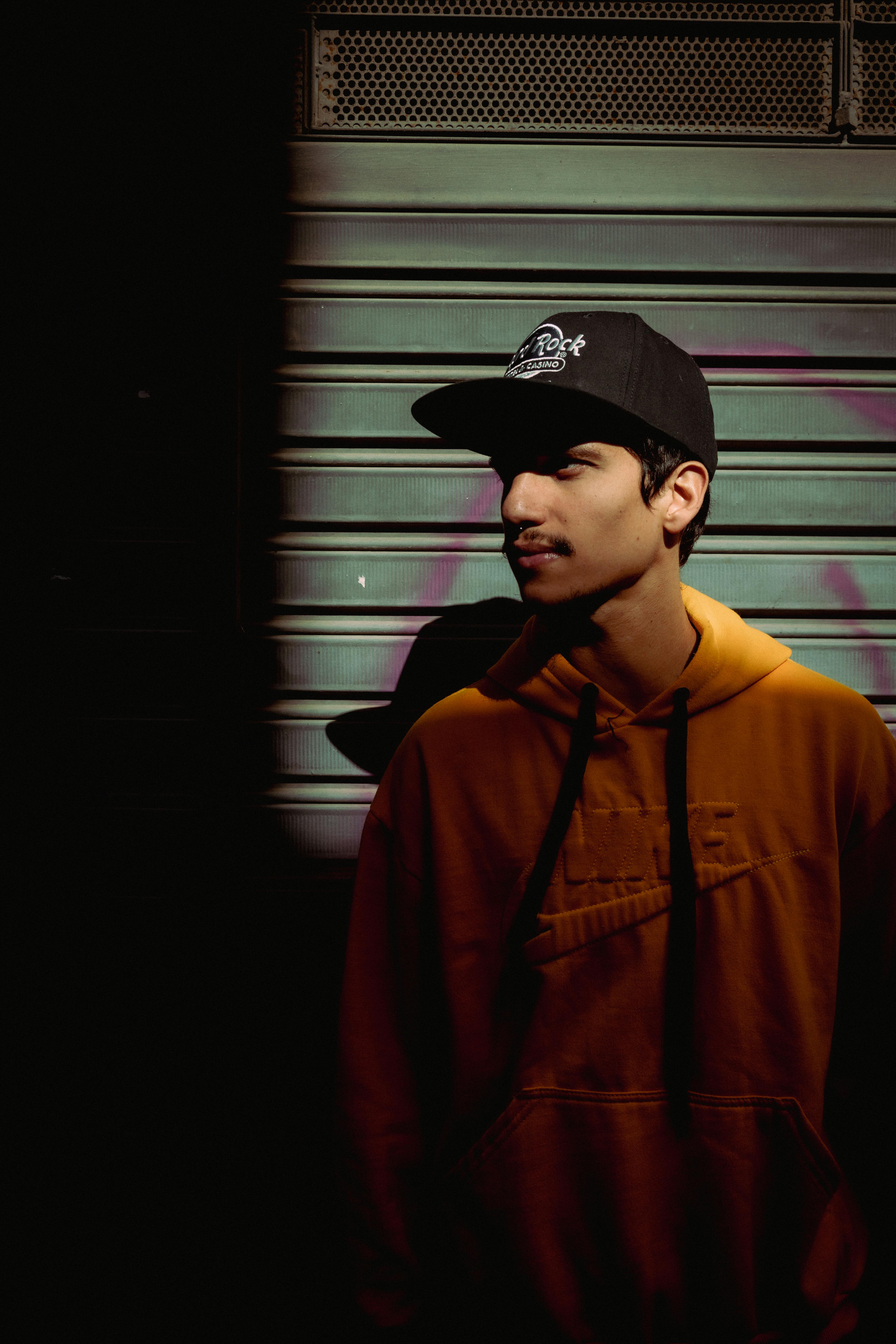 Photo of Man Wearing Black Cap · Free Stock Photo