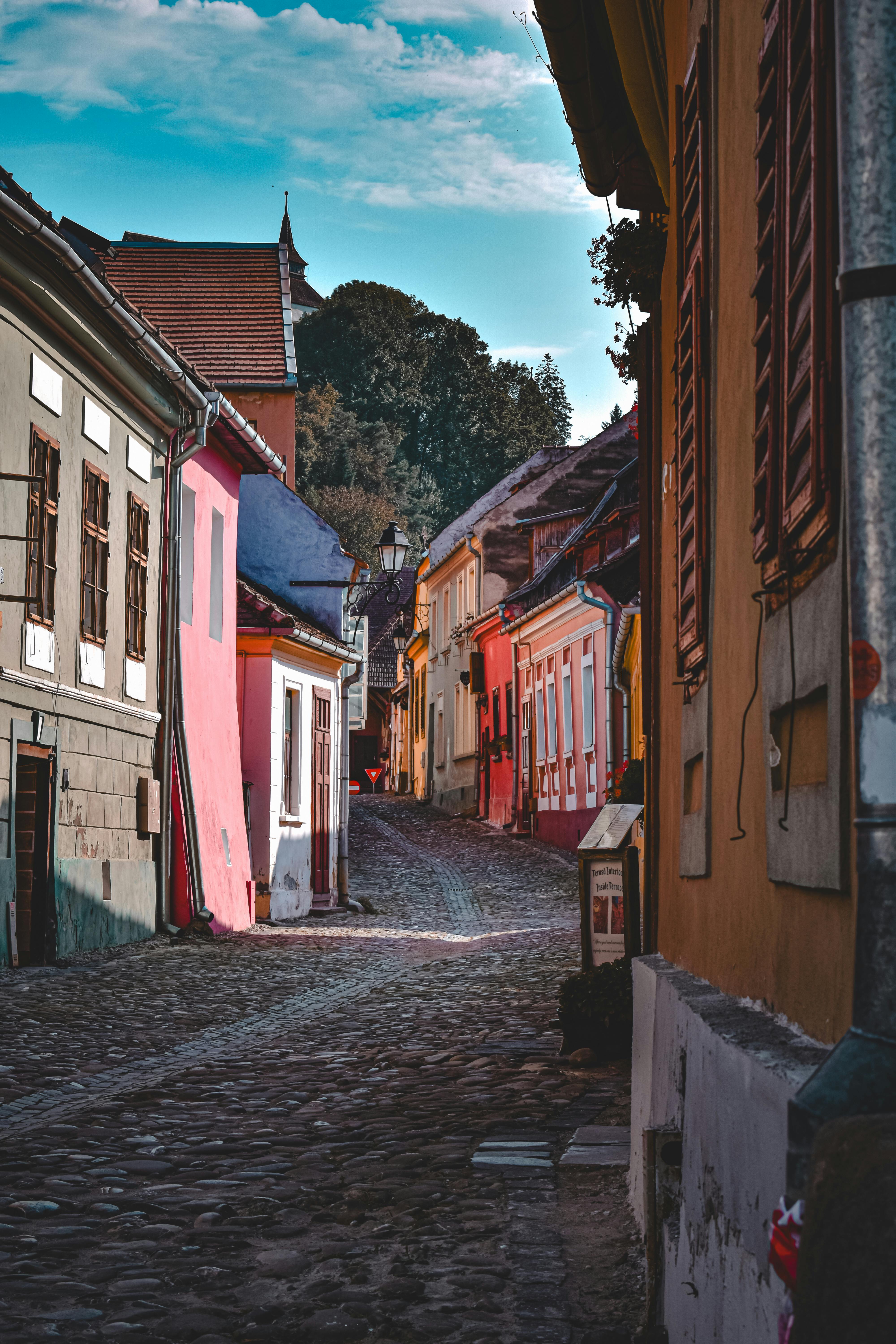Old Buildings on Narrow City Street · Free Stock Photo