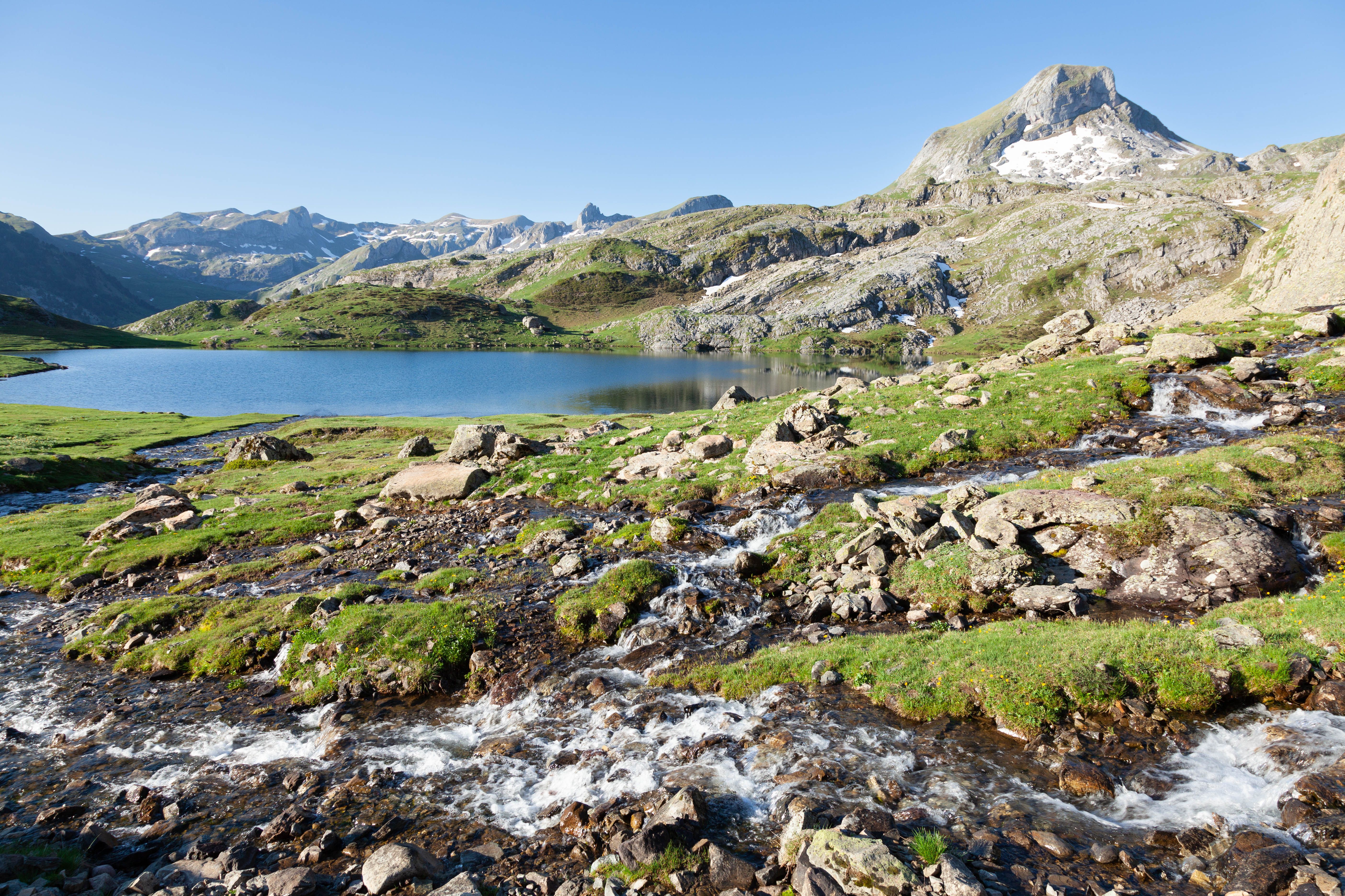 Stream and Lake with Rocks around · Free Stock Photo