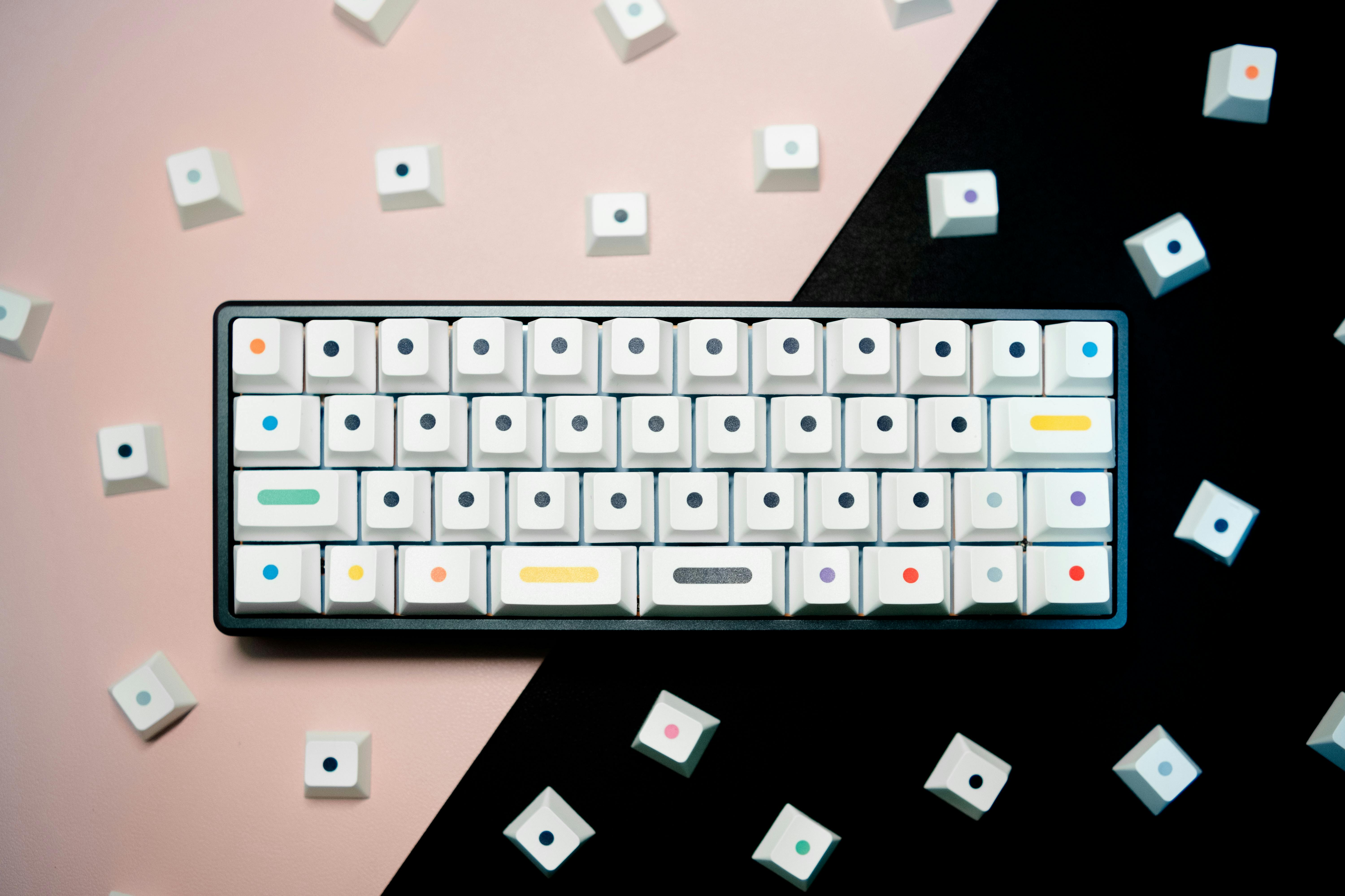 Small Mechanical Keyboard With GMK Dots Keycaps · Free Stock Photo