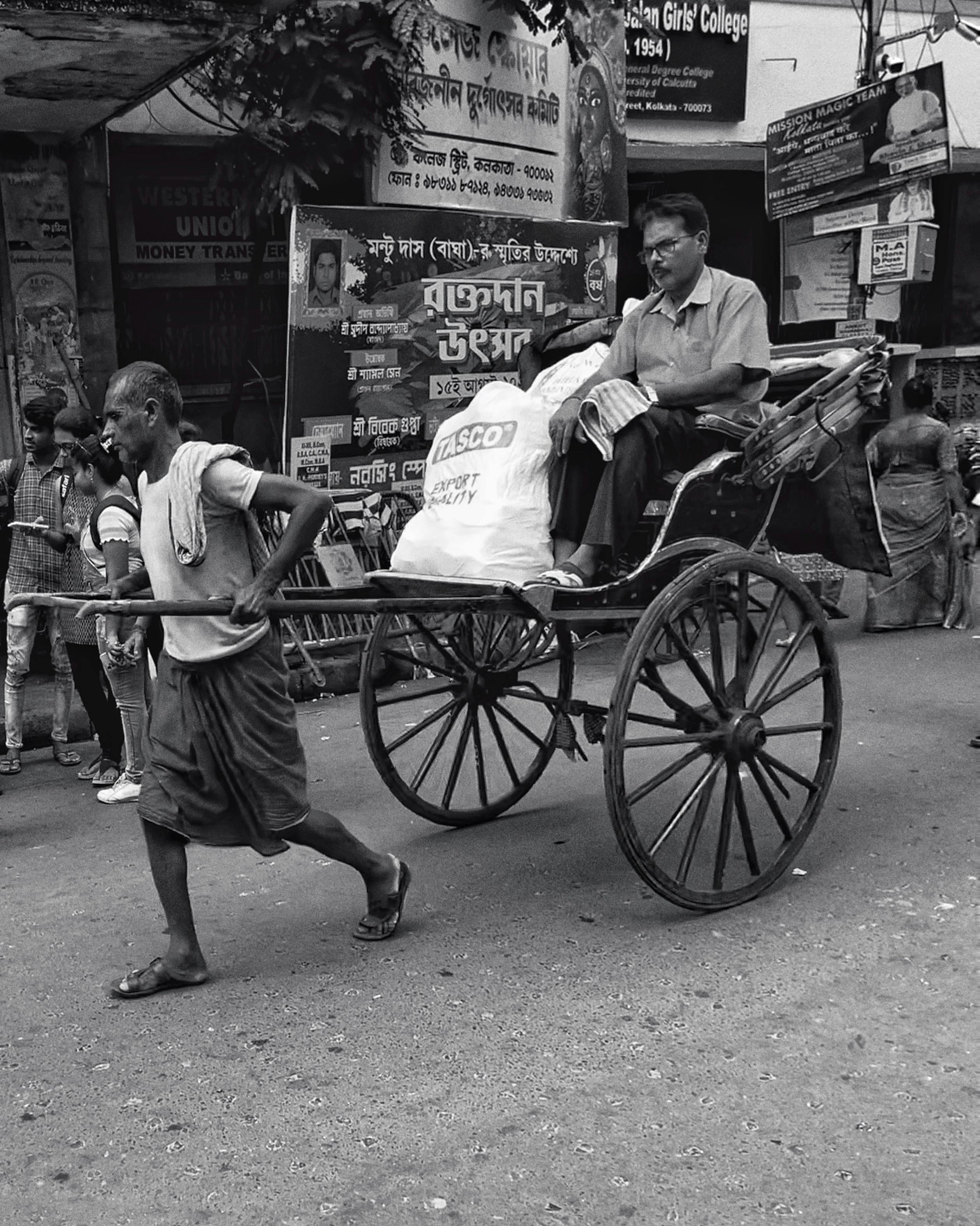 Man Riding in Rickshaw · Free Stock Photo