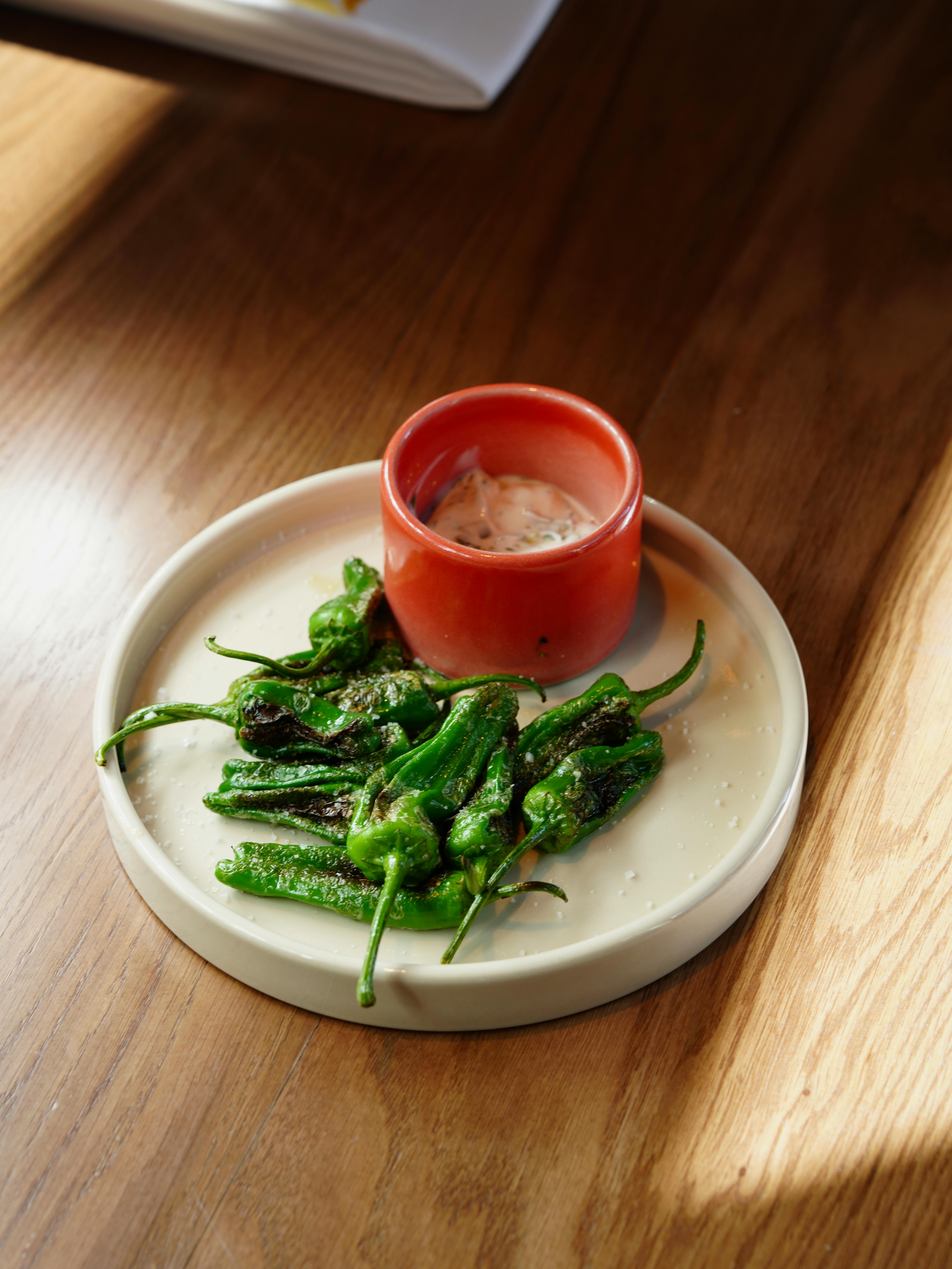 Green Fried Chili Peppers on White Plate · Free Stock Photo