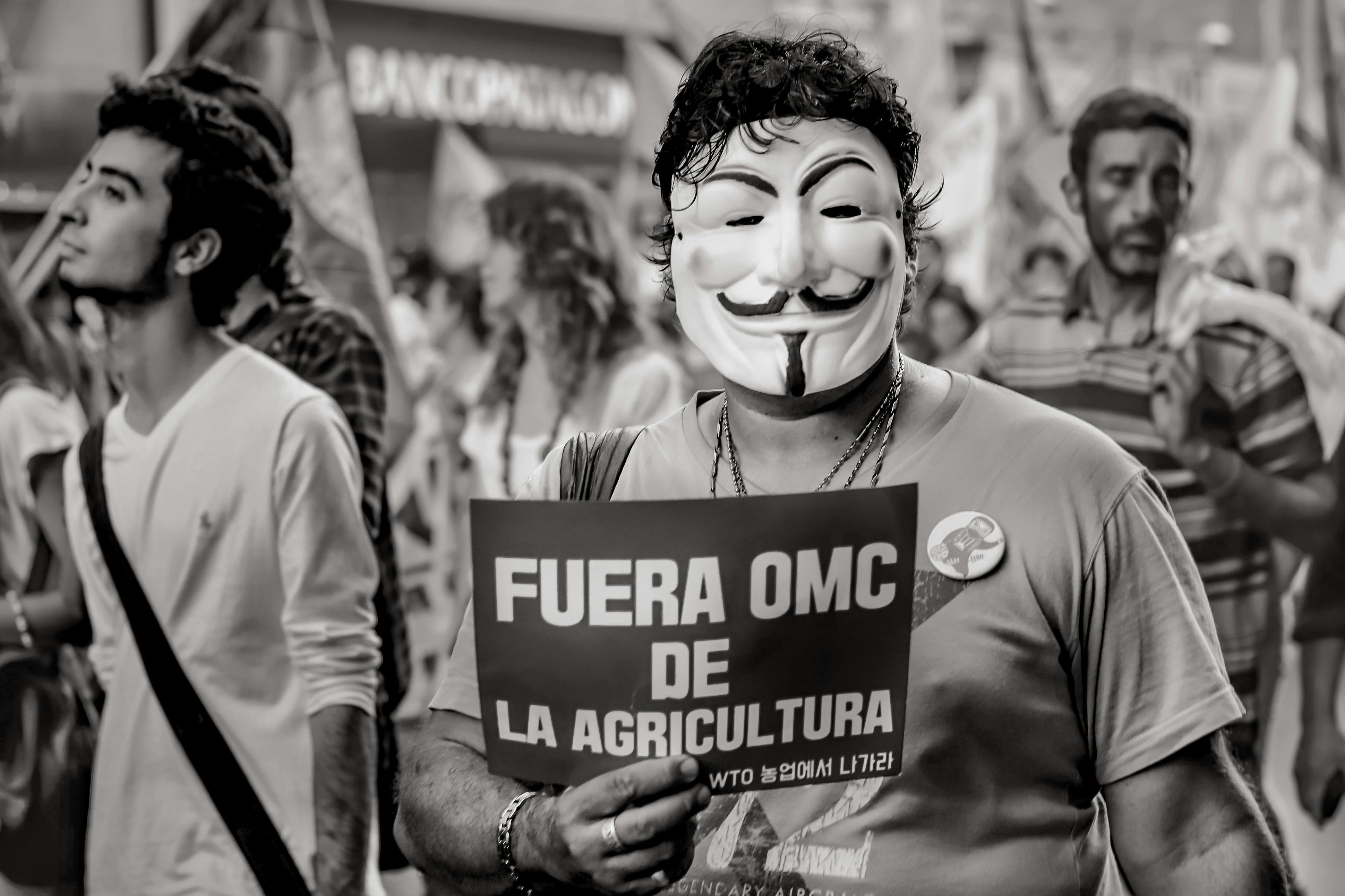 Man in Anonymous Mask on Protest in City · Free Stock Photo