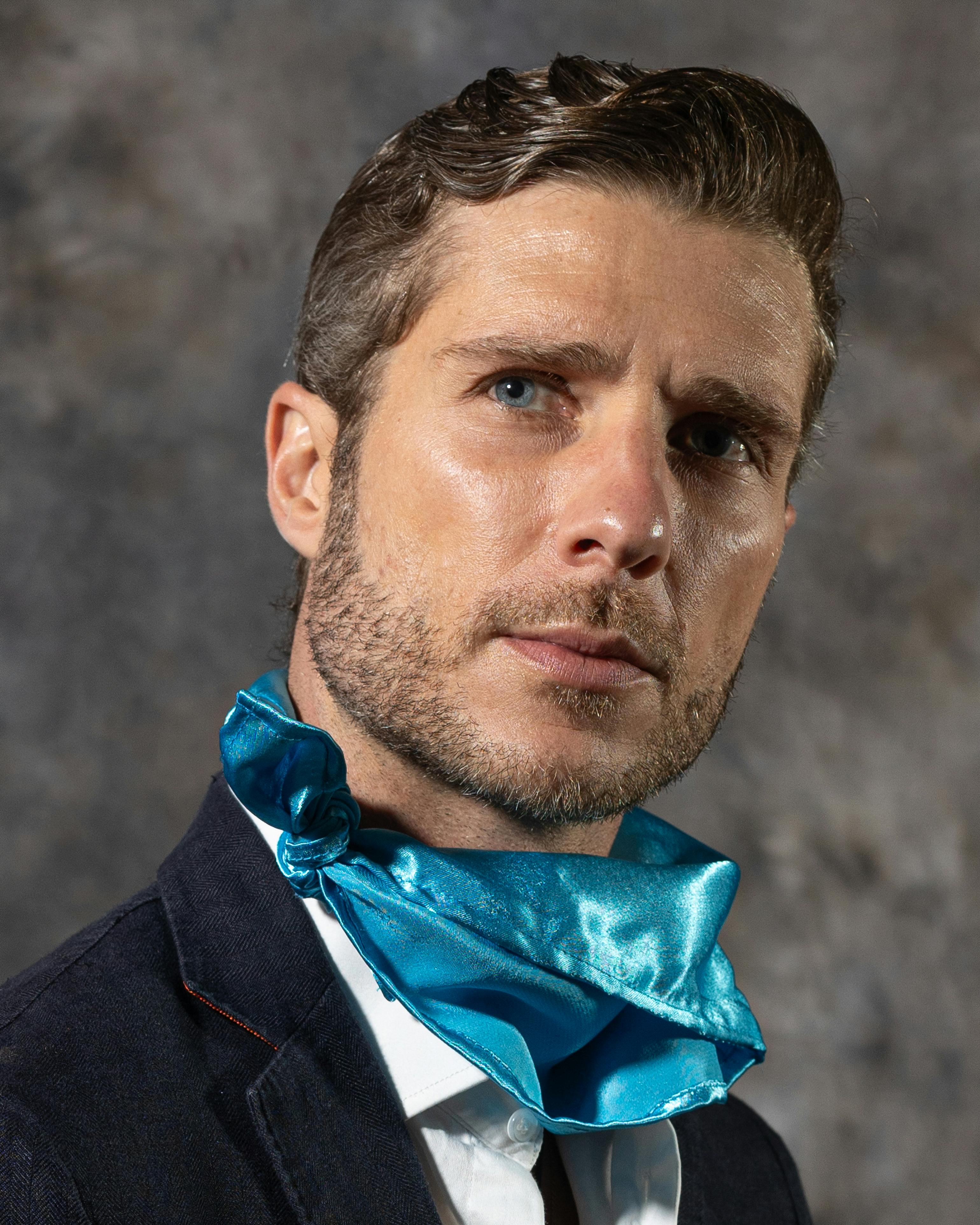 Man in Black Outfit Sitting on a Chair Backwards · Free Stock Photo