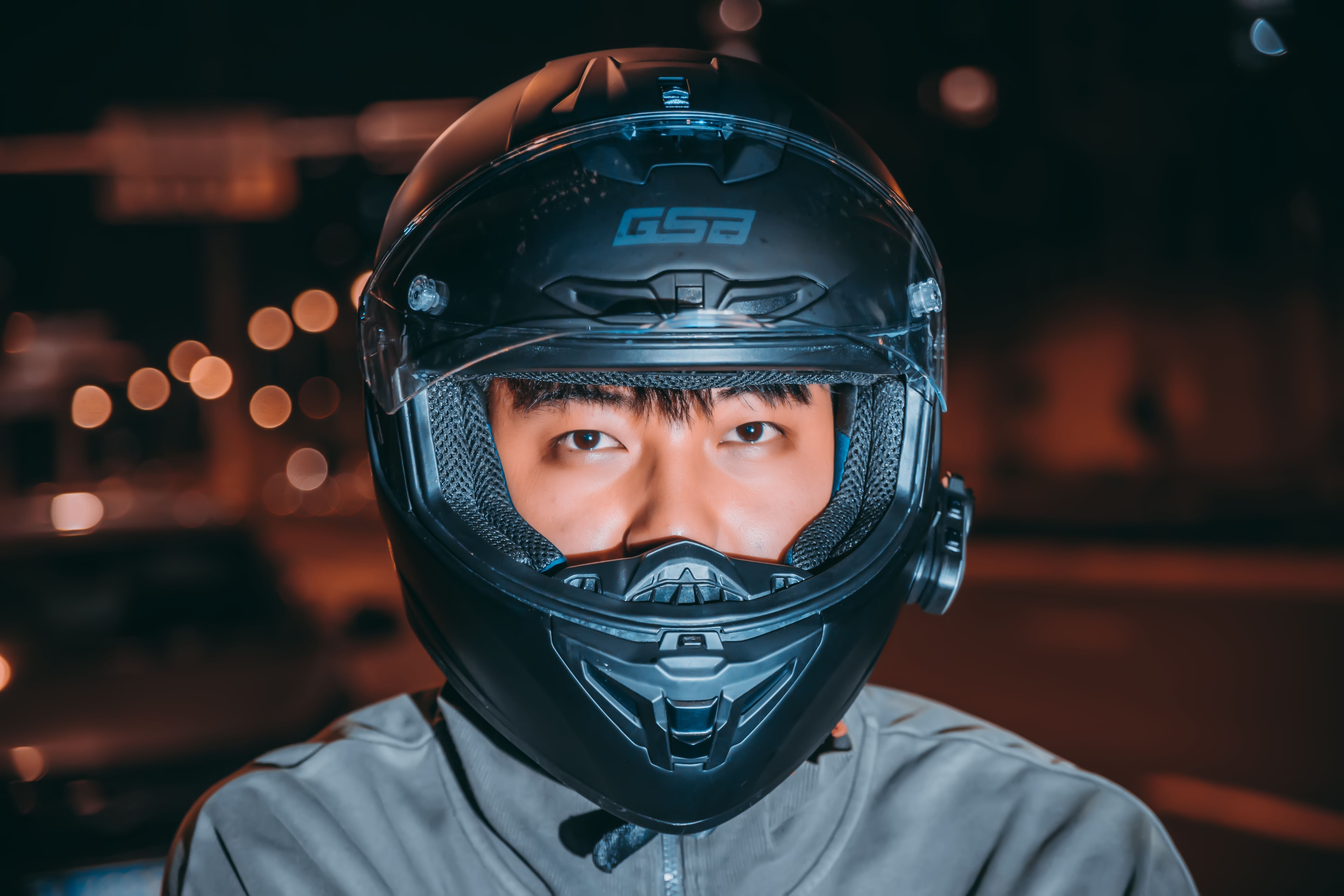 Close-up Photo of Bearded Man in Black Motorcycle Helmet with Brass ...