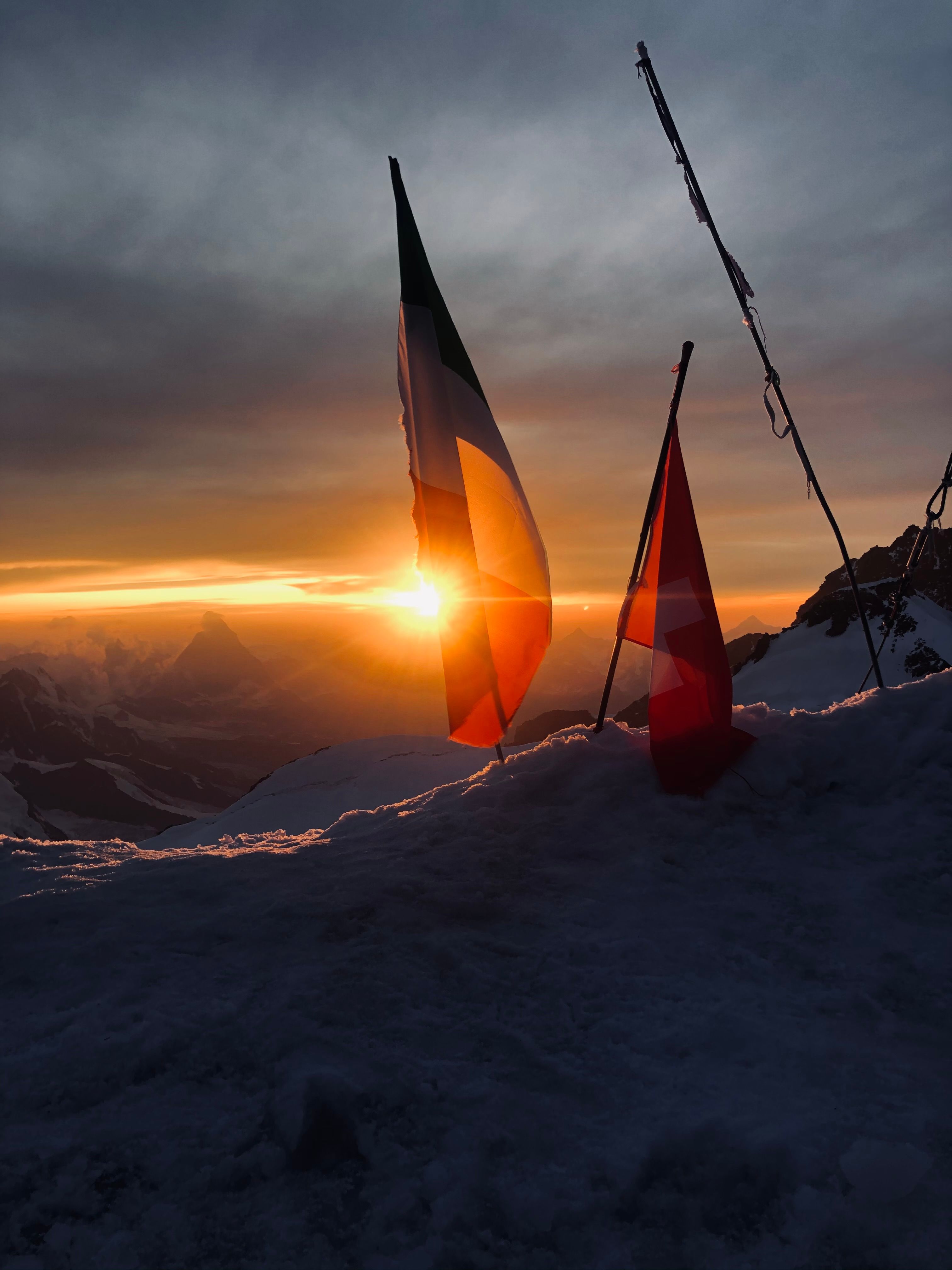 Flags in Snow on Mountain at Dusk · Free Stock Photo