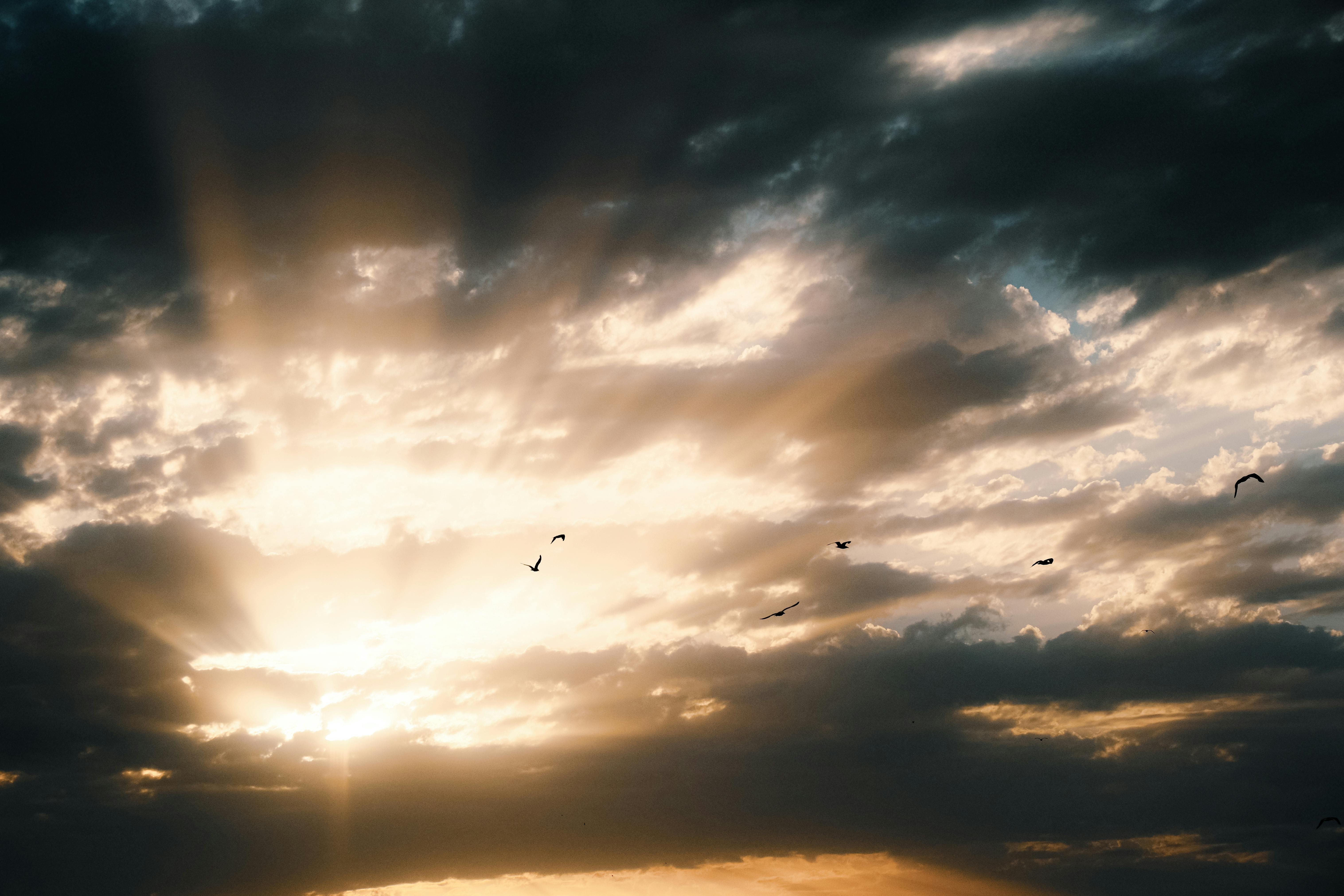 Bright Sunbeam Piercing through Clouds · Free Stock Photo