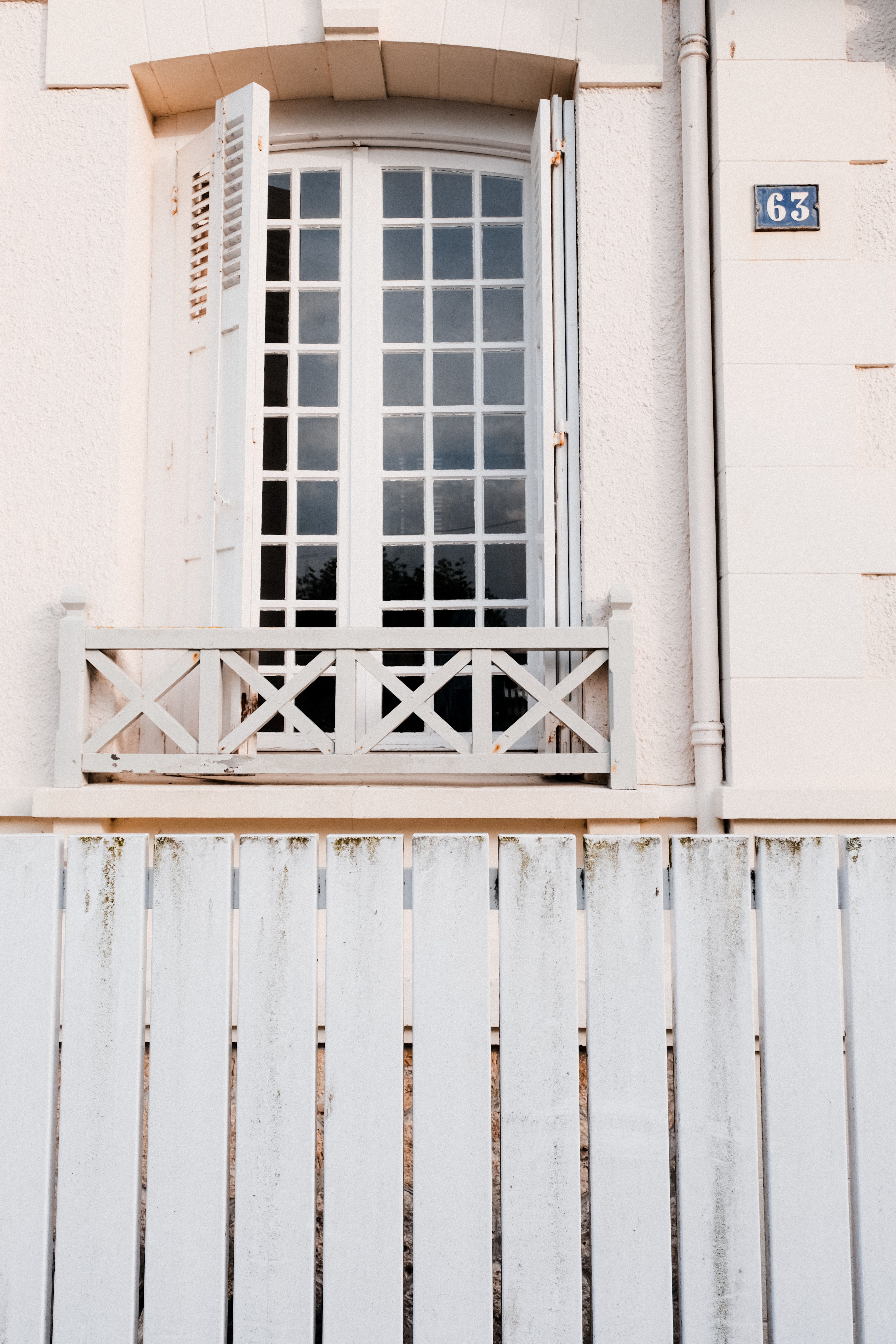 Wooden Fence and Windows behind · Free Stock Photo