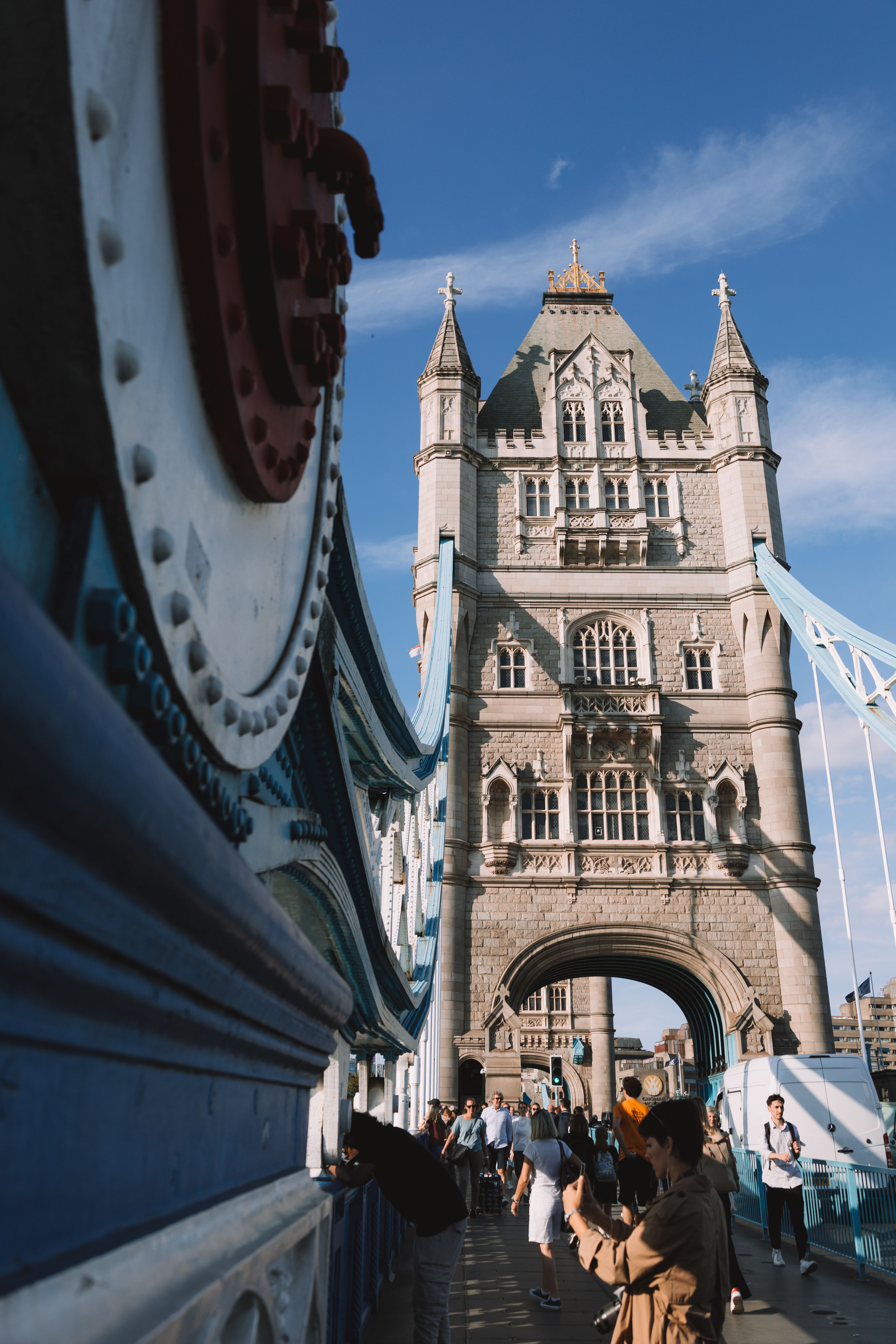 Tourist Walking on Tower Bridge in London · Free Stock Photo