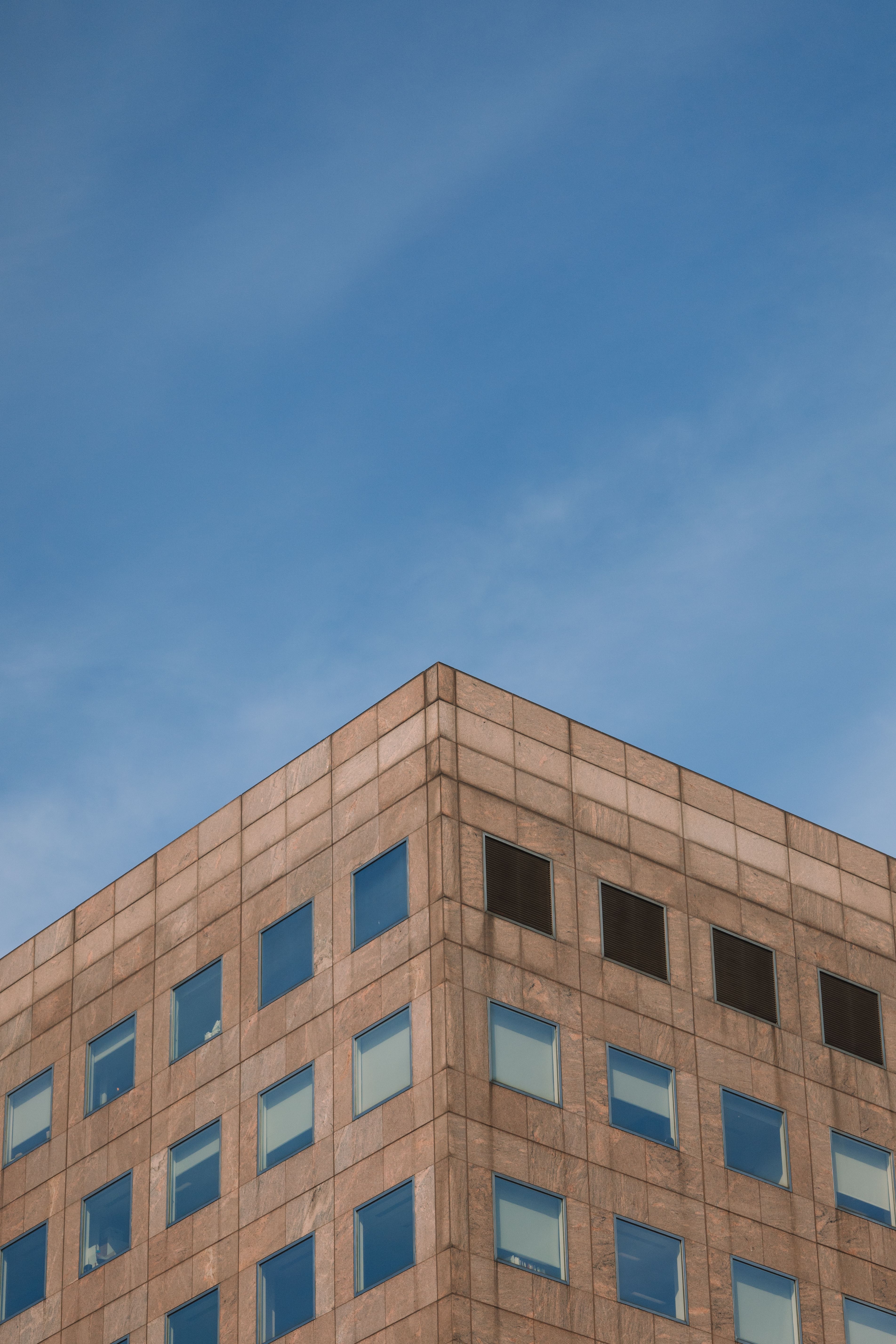 Geometric Facade of Modern Office Building · Free Stock Photo