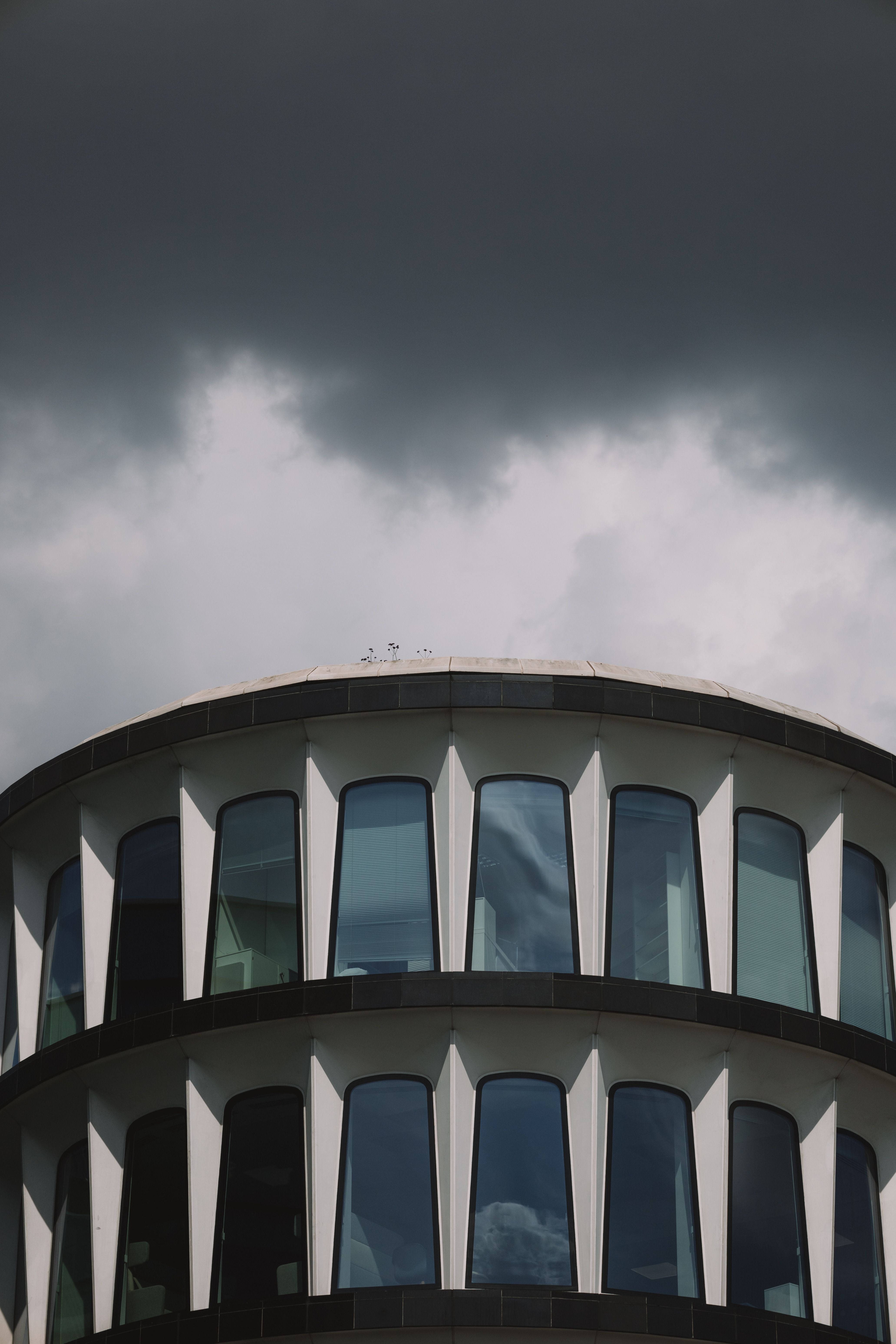 Rain Cloud over Building · Free Stock Photo