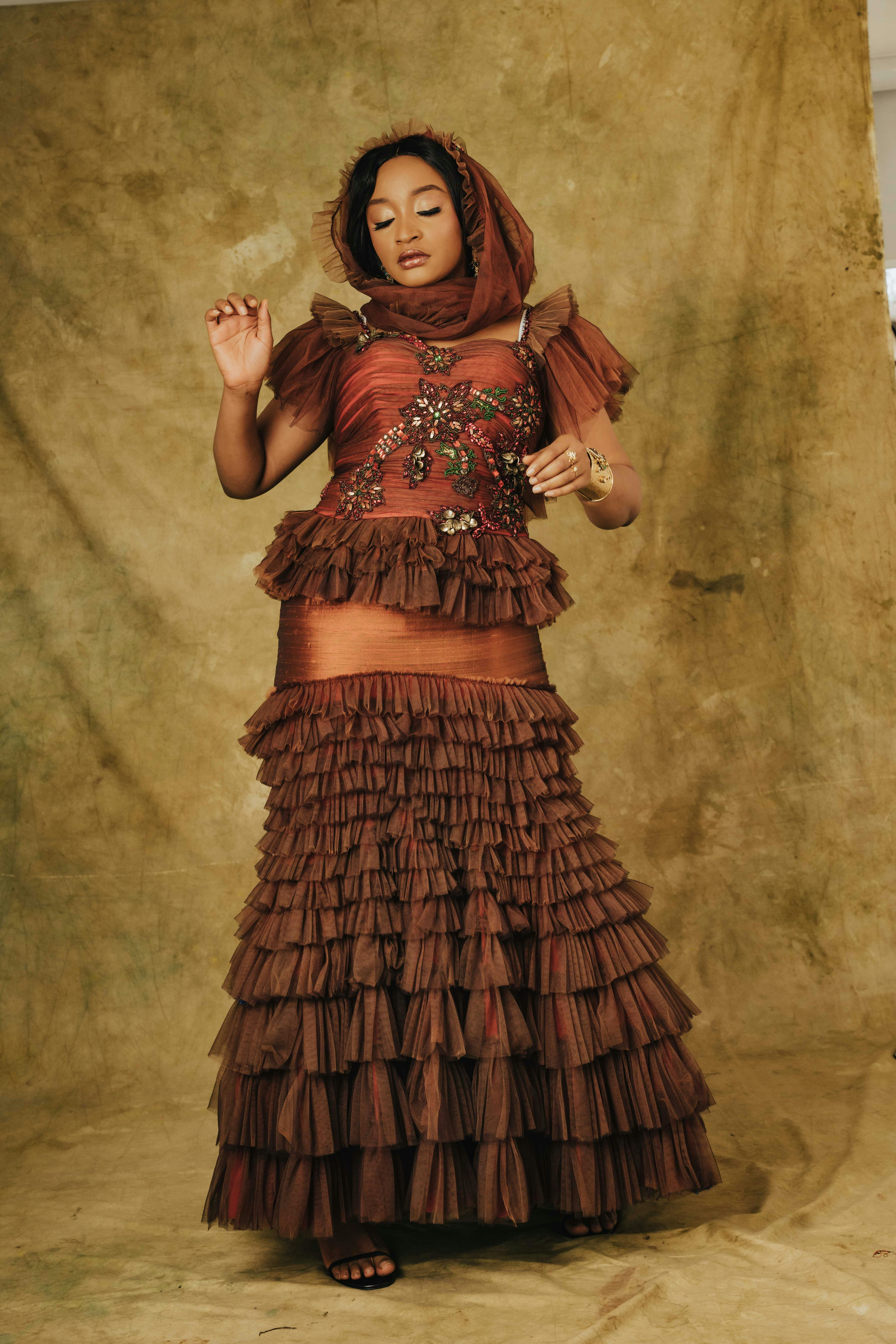 Woman Posing in a Traditional Dress · Free Stock Photo