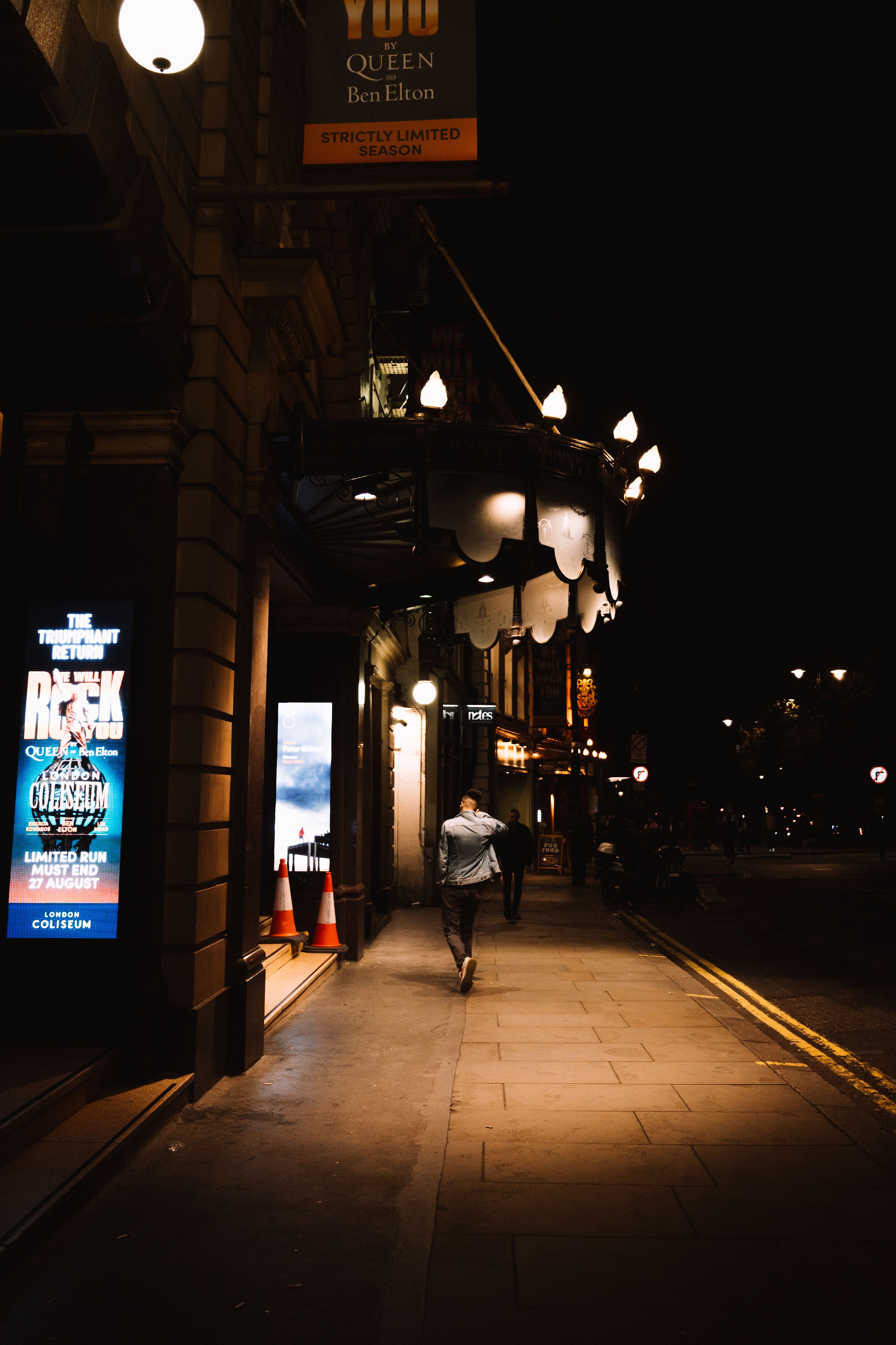 Man Walking on a Street at Night · Free Stock Photo
