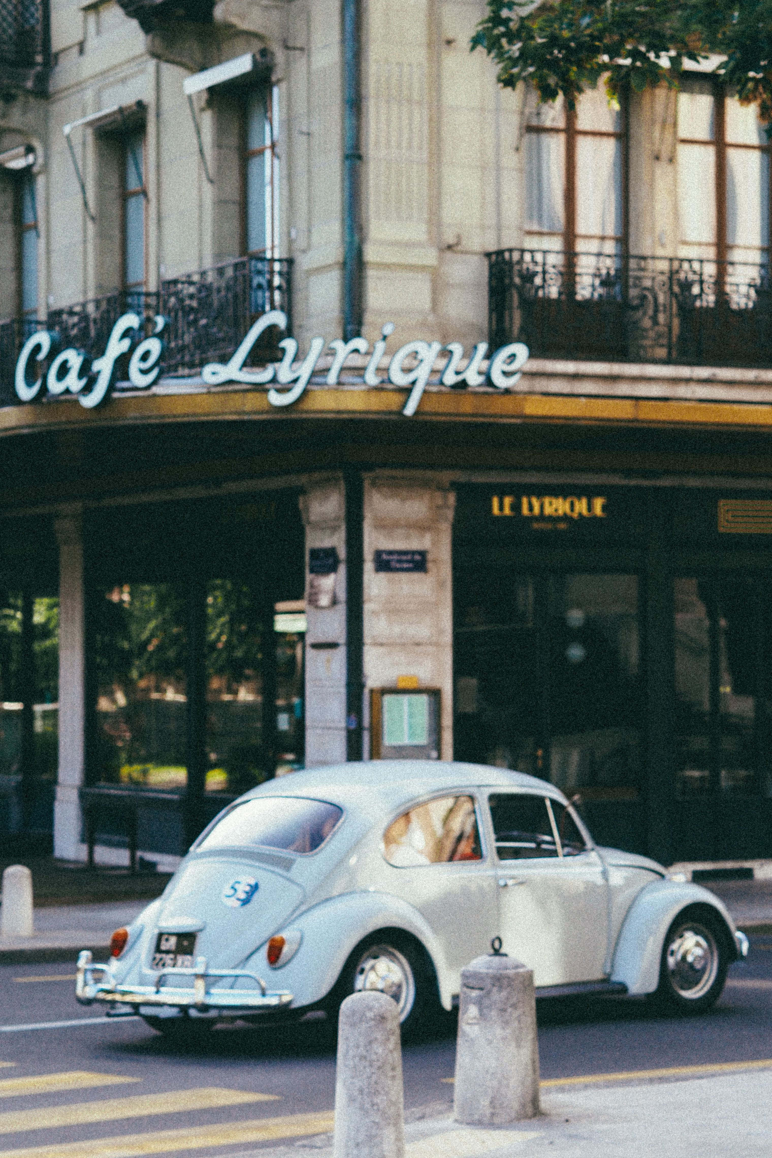 Vintage Volkswagen Beetle Parked on Steep Street · Free Stock Photo