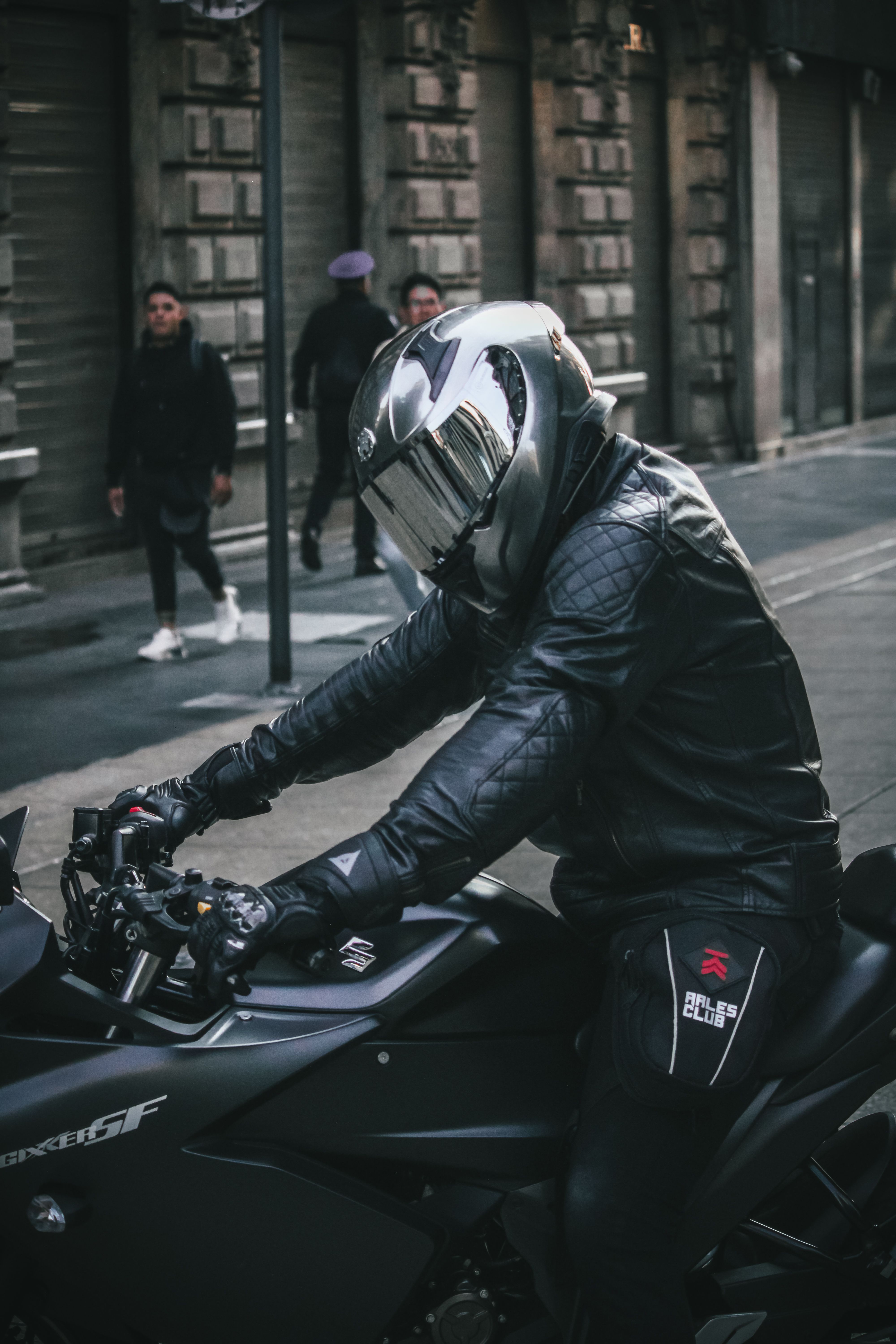 Biker in Leather Jacket and Black Helmet · Free Stock Photo