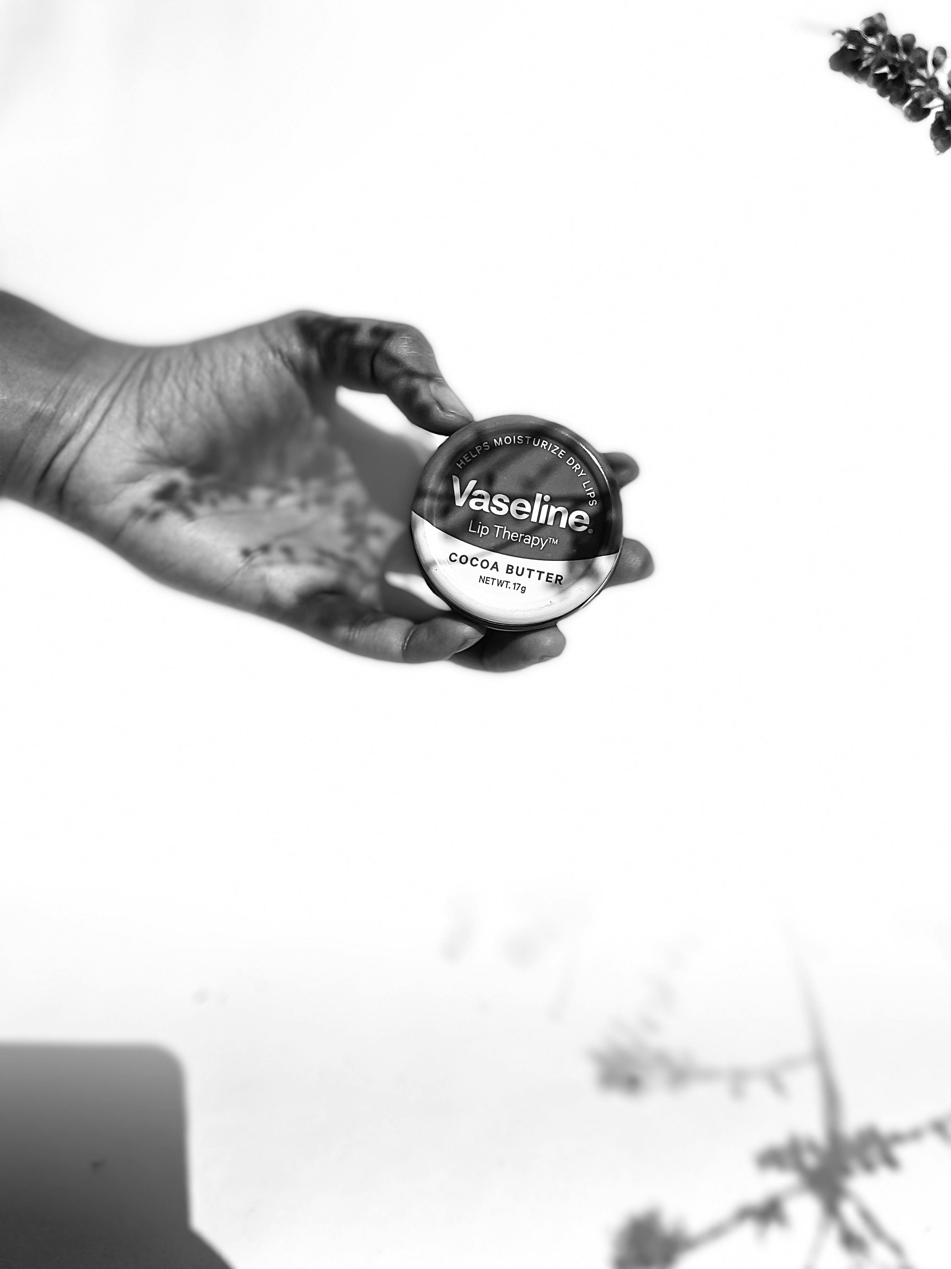 Hand Holding Box with Vaseline · Free Stock Photo