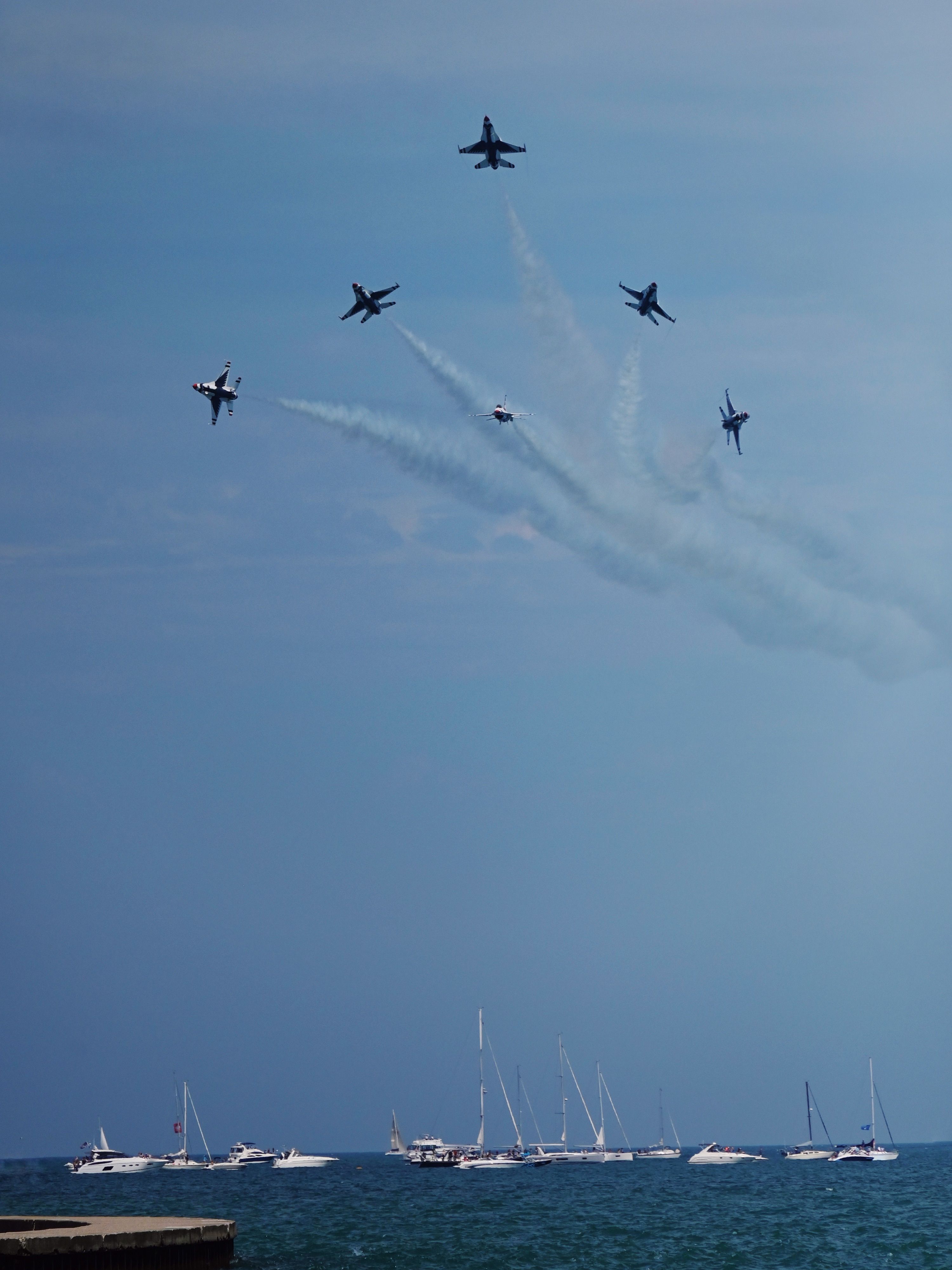 Military Jets Flying Above Boats in the Sea · Free Stock Photo
