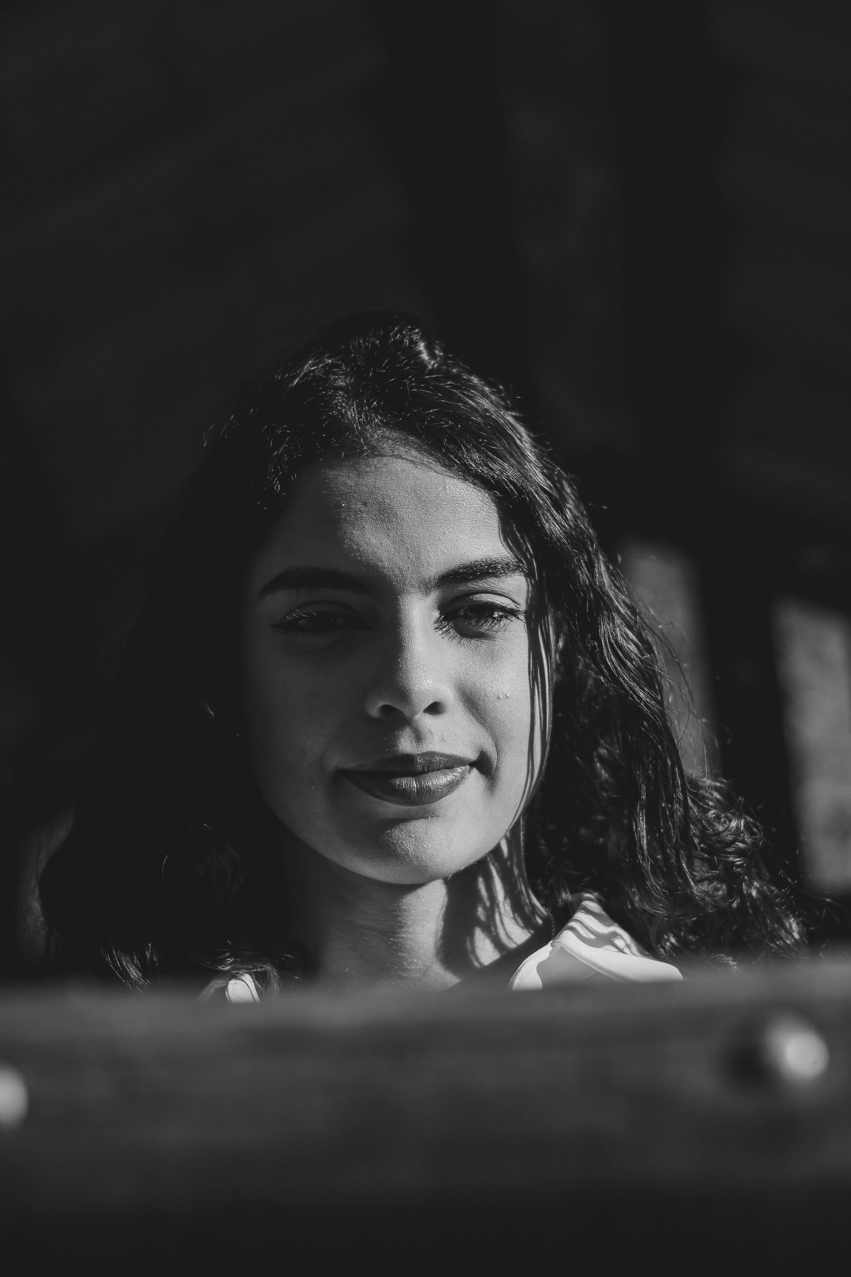 Overexposed Black and White Photo of a Woman Standing Outside · Free ...