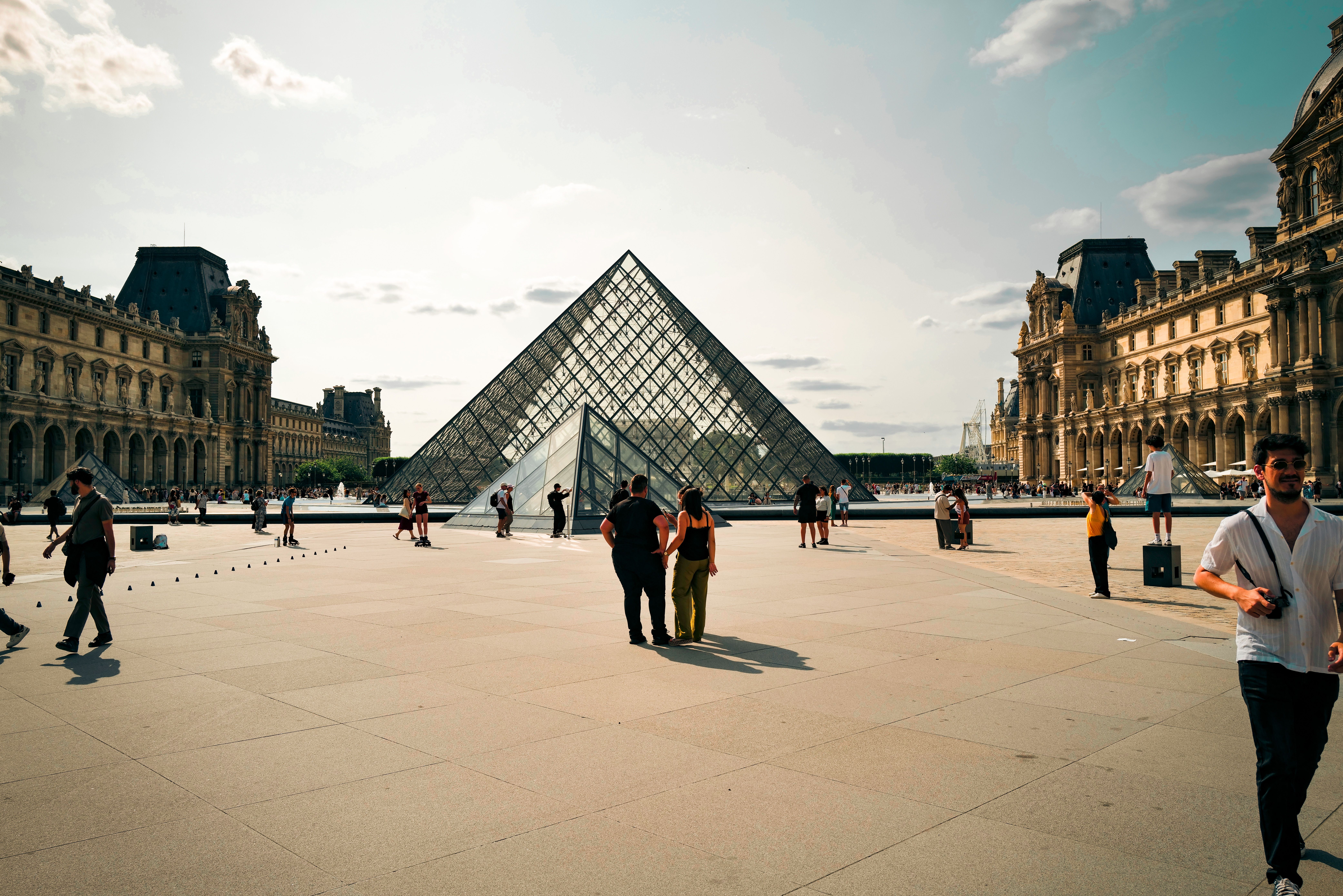 People around Louvre Pyramid · Free Stock Photo