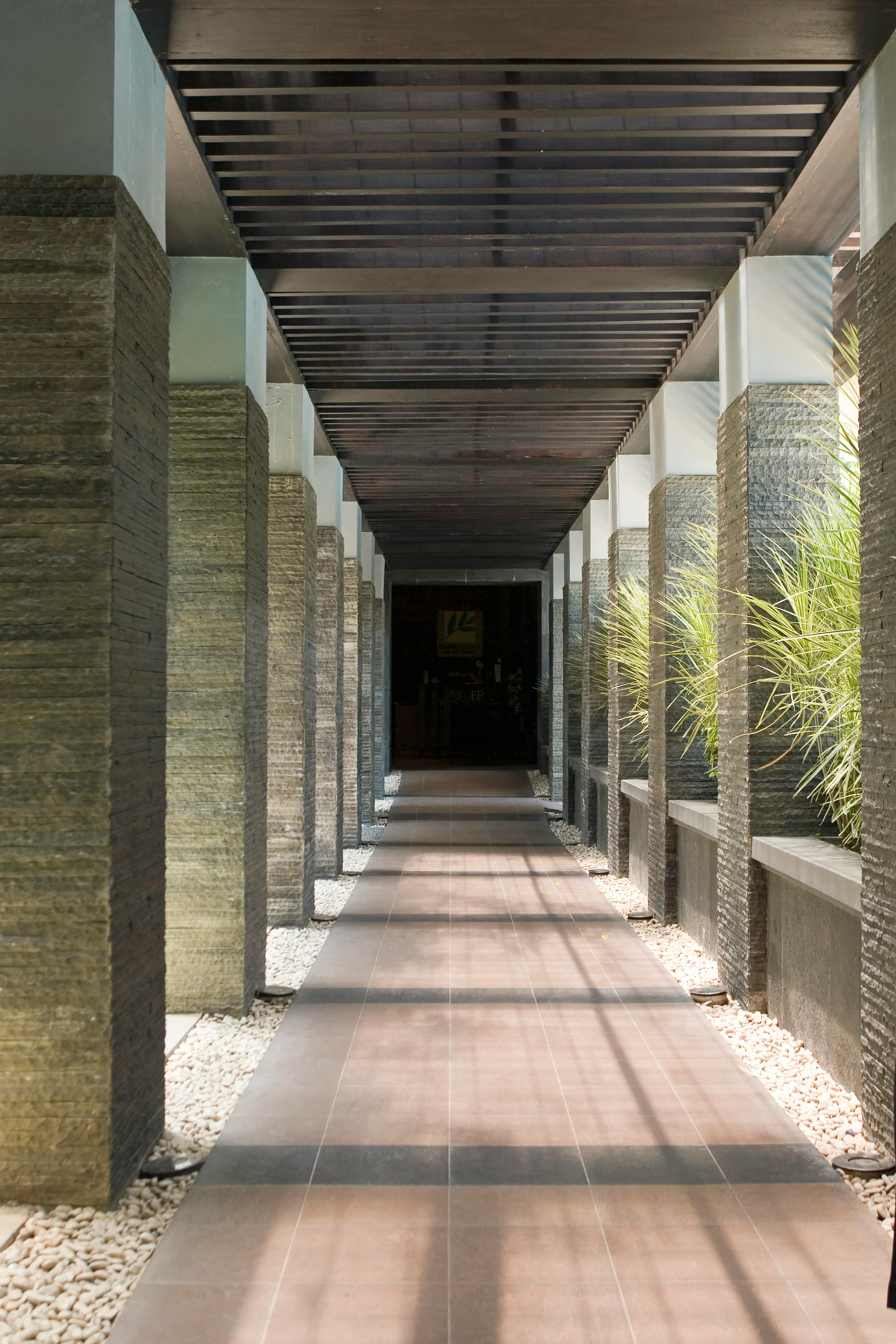 Colonnade around Empty Corridor · Free Stock Photo