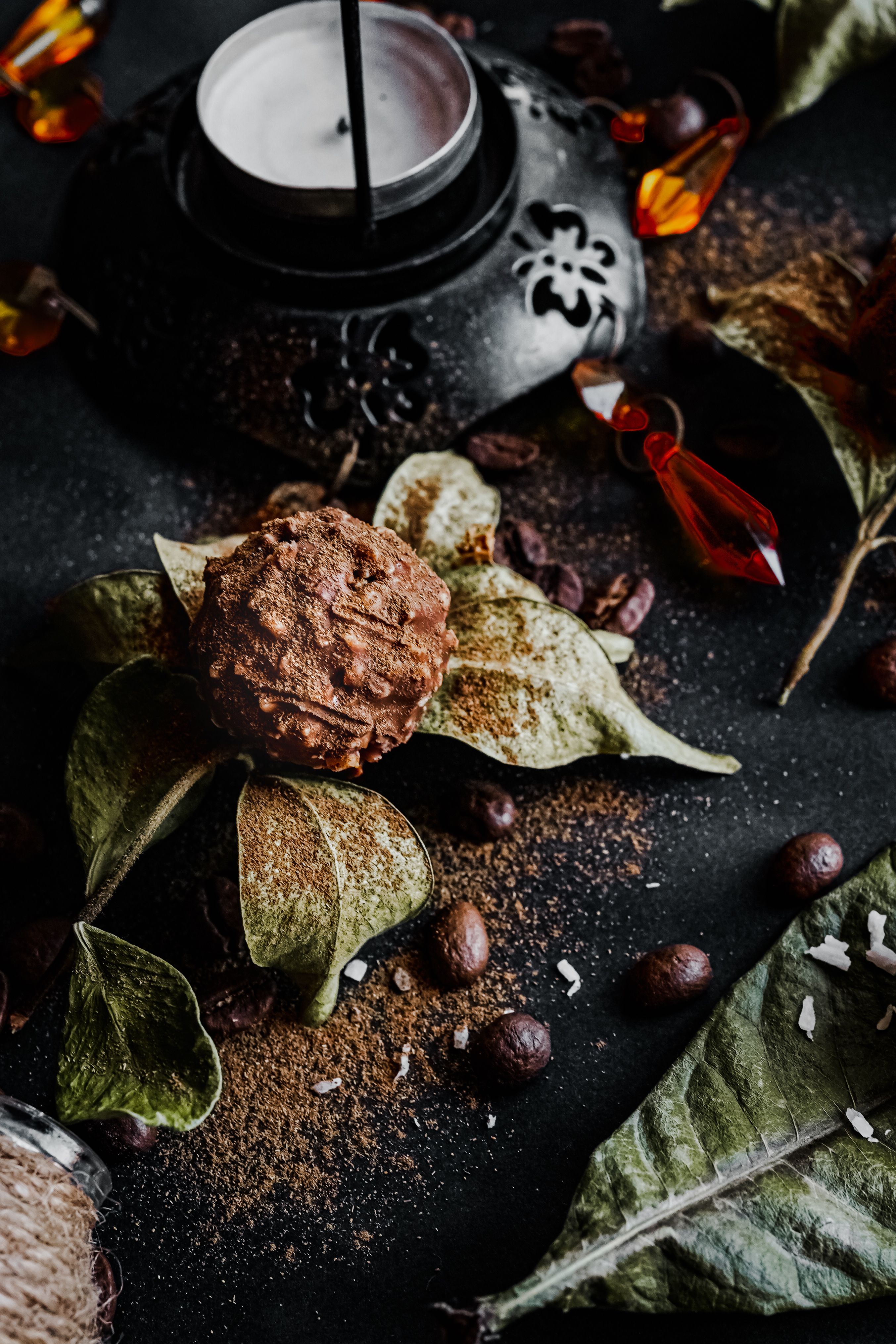 Candle, Leaves and Nuts on Ground · Free Stock Photo