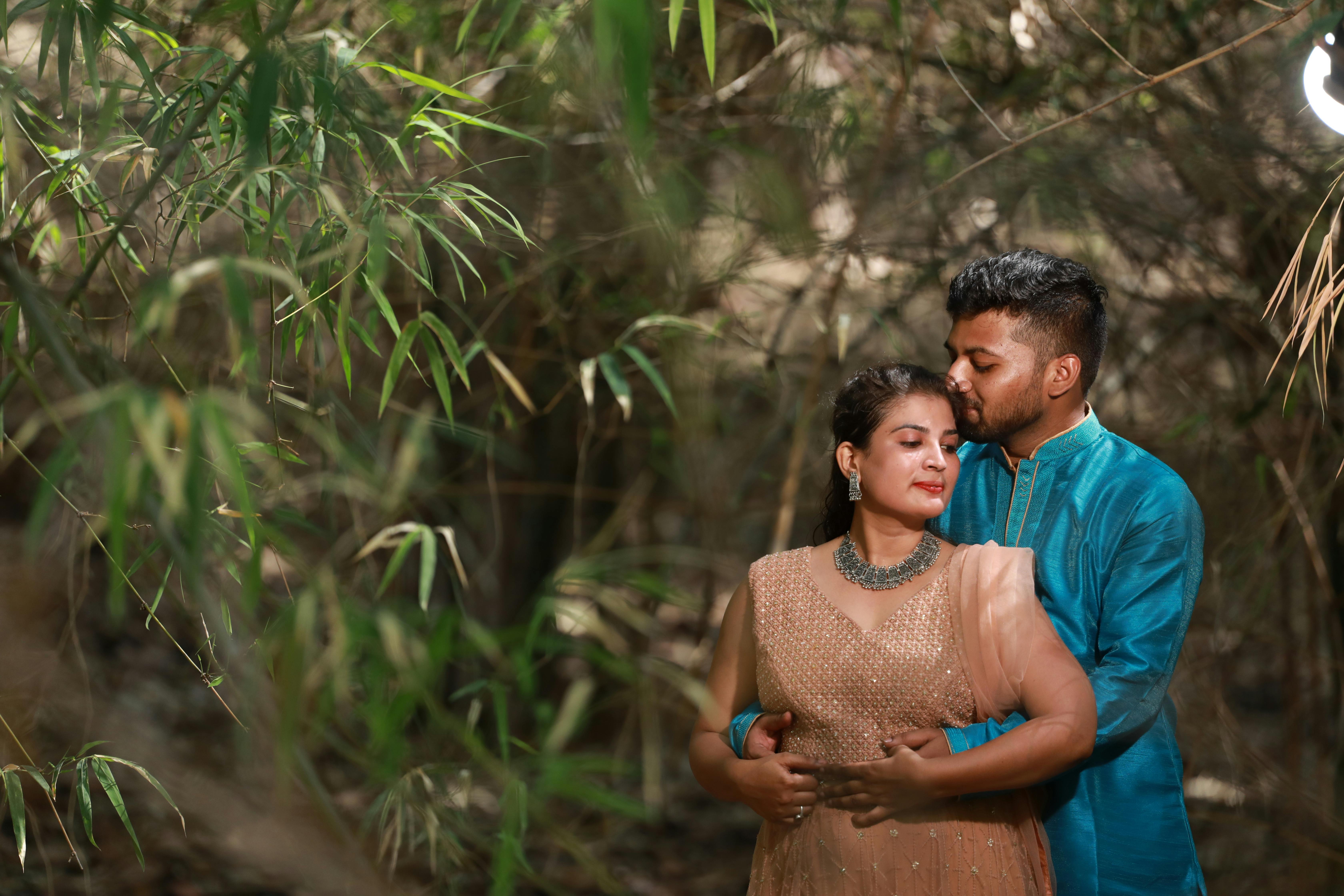 Indian Couple Hugging in Tropical Forest · Free Stock Photo