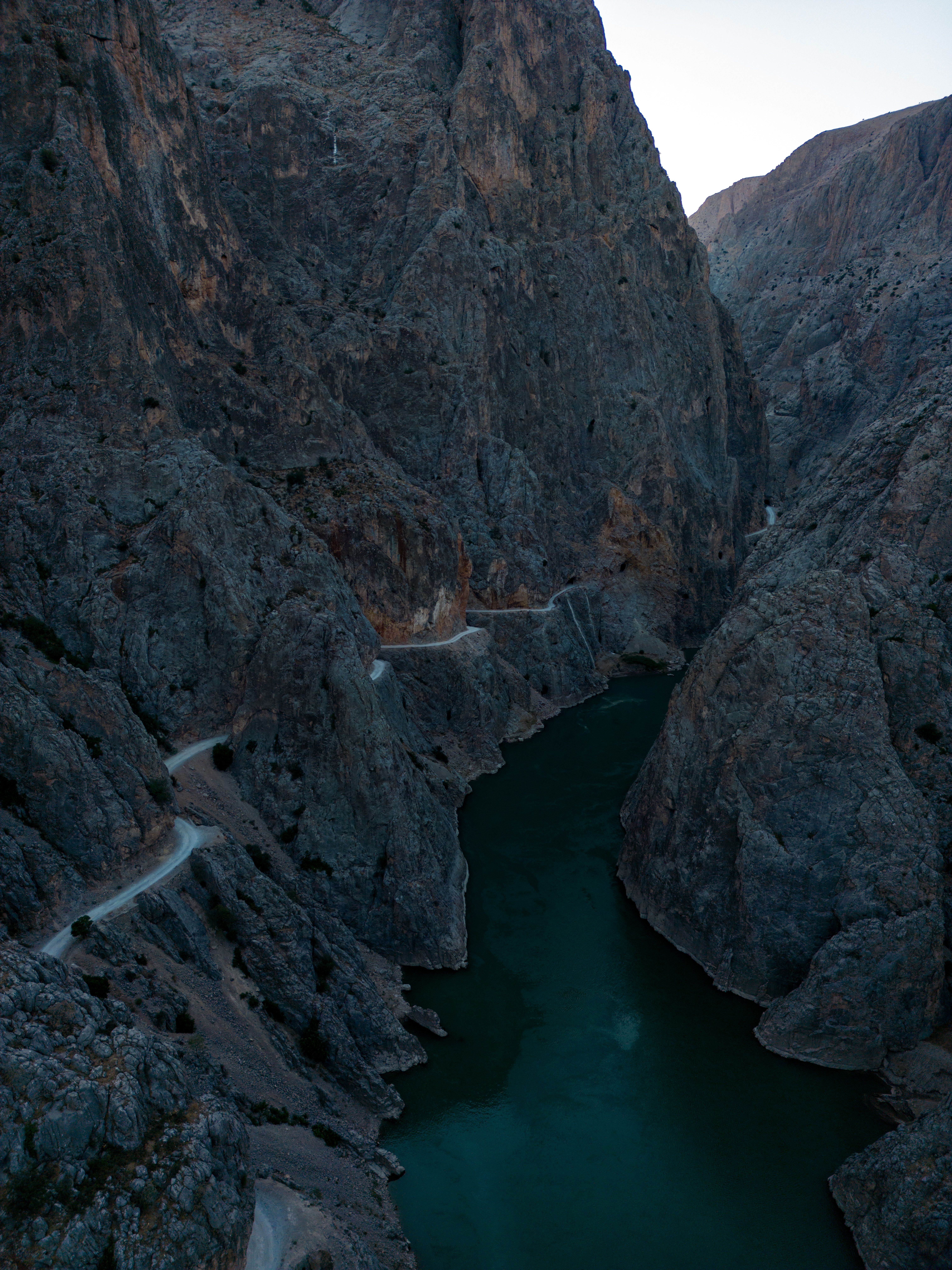 Body of Water Between Mountains · Free Stock Photo