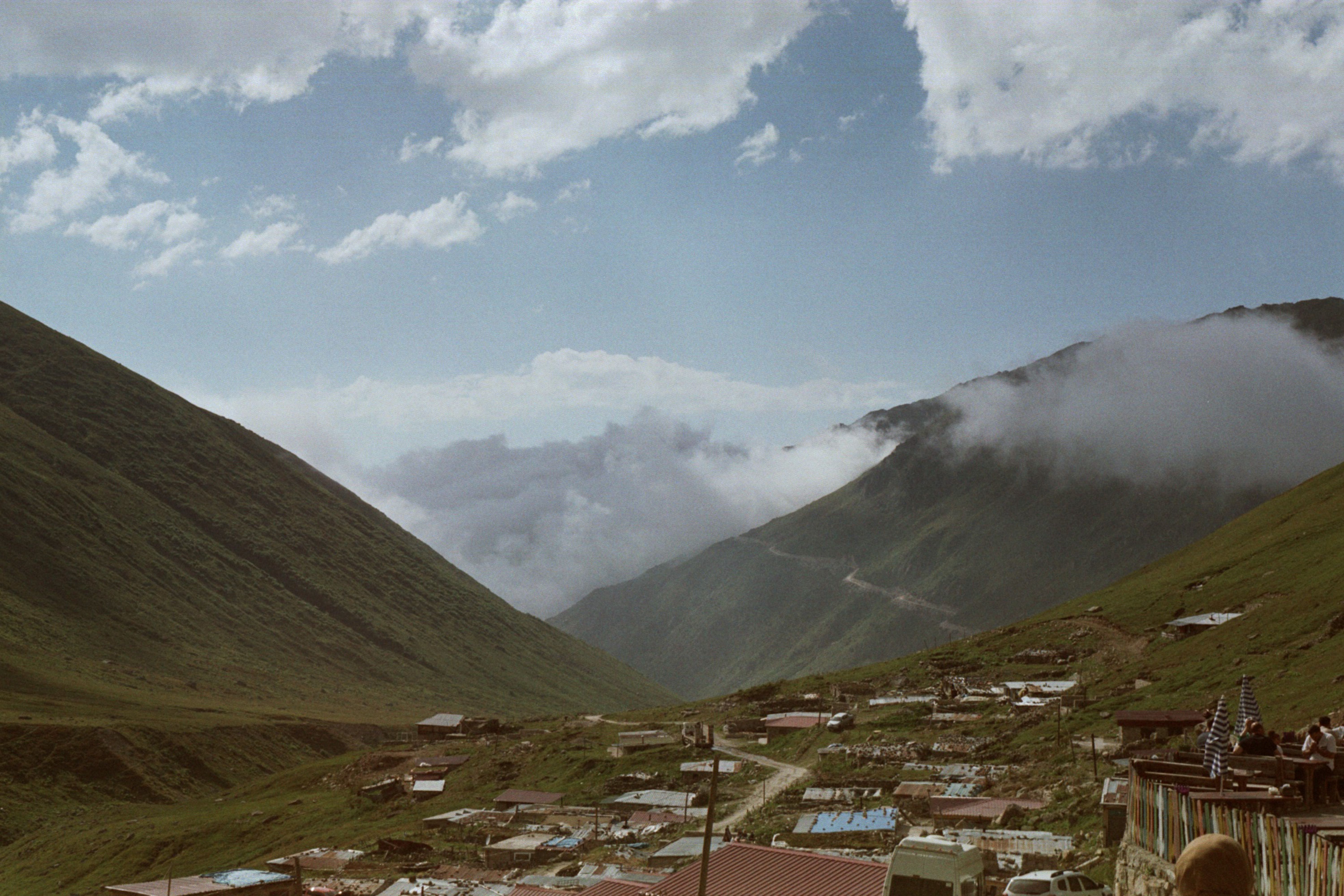 Buildings in a Mountain Valley · Free Stock Photo