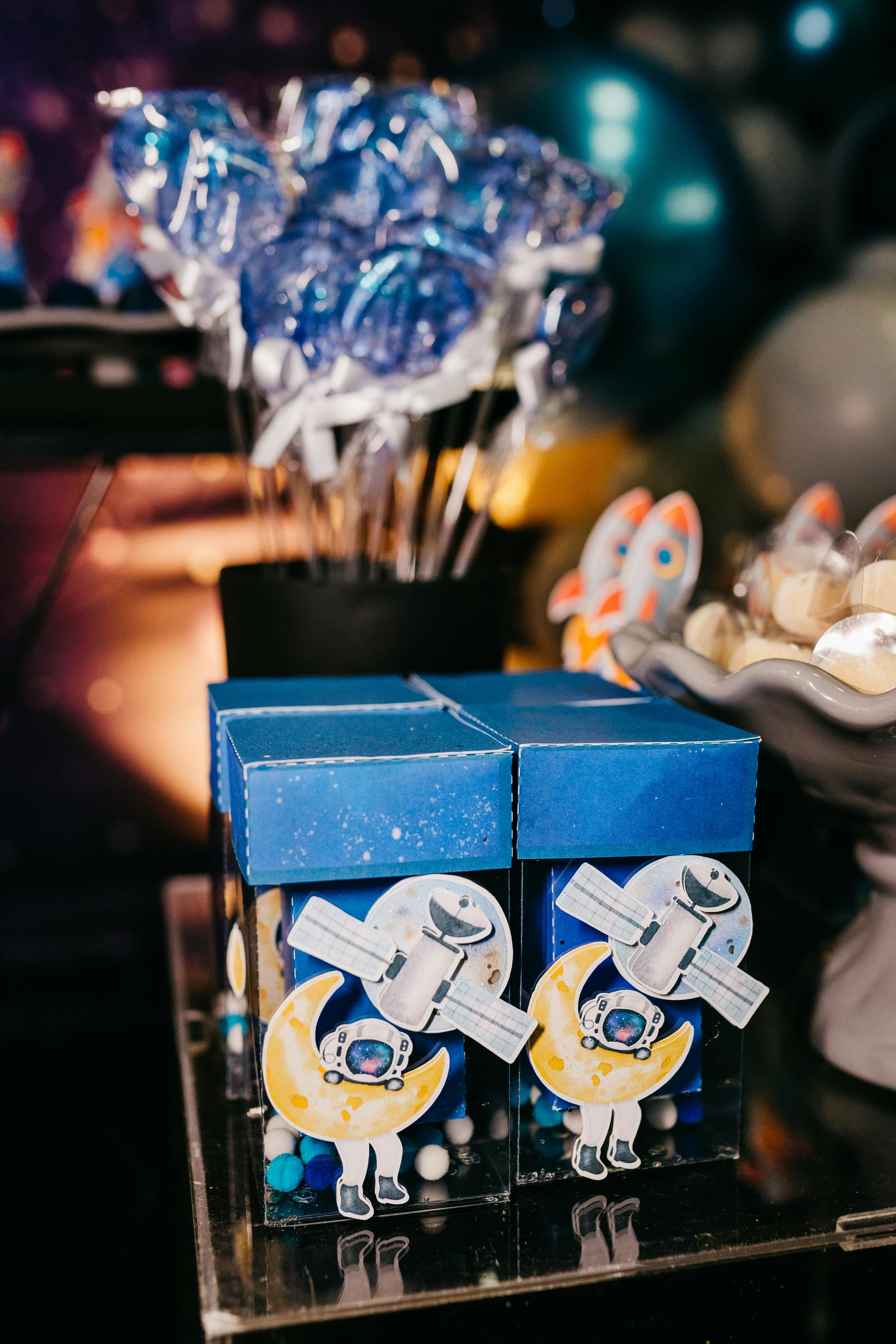 Boxes with Astronaut Figurines · Free Stock Photo