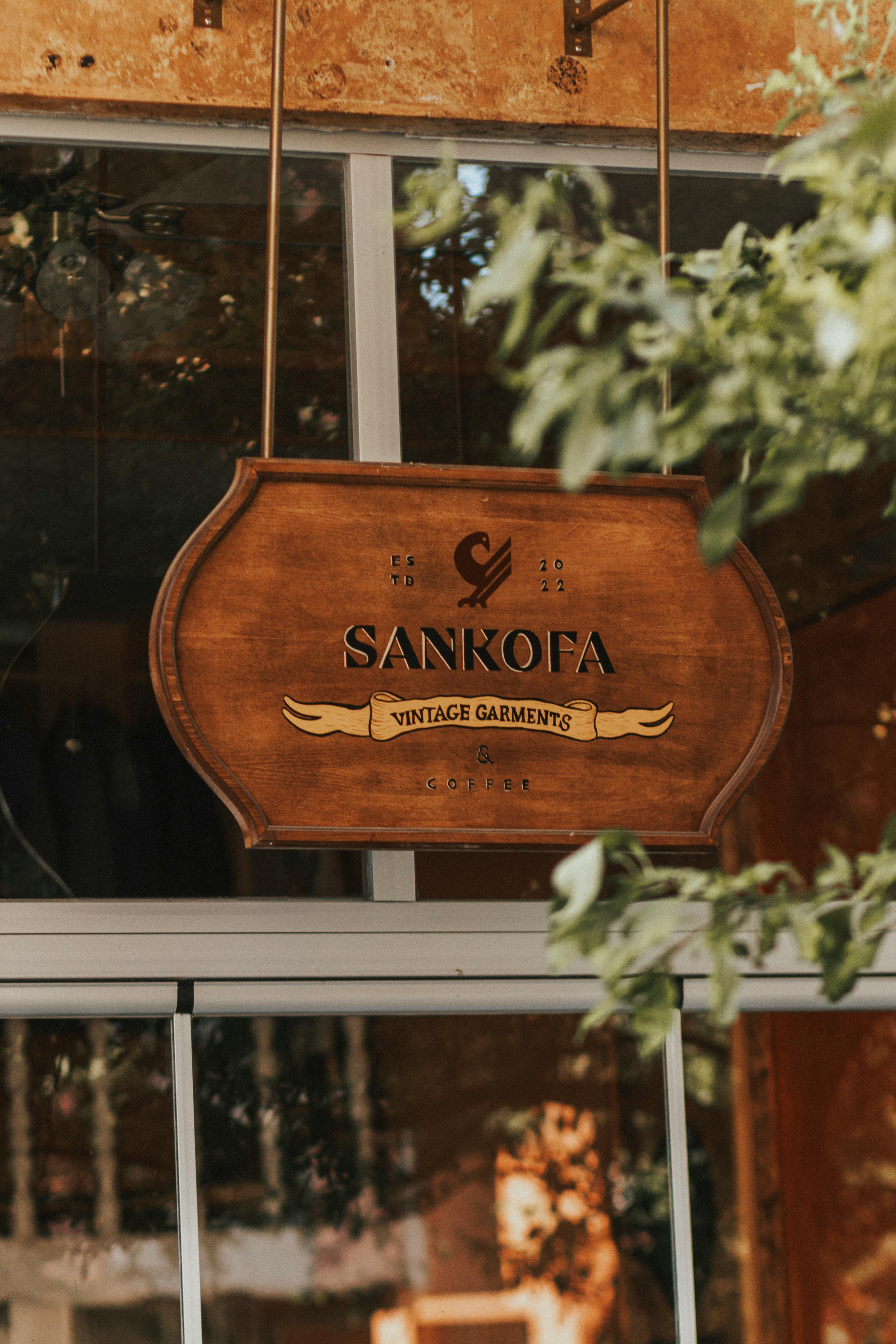 Sign of Coffee Shop on Ancient Building · Free Stock Photo