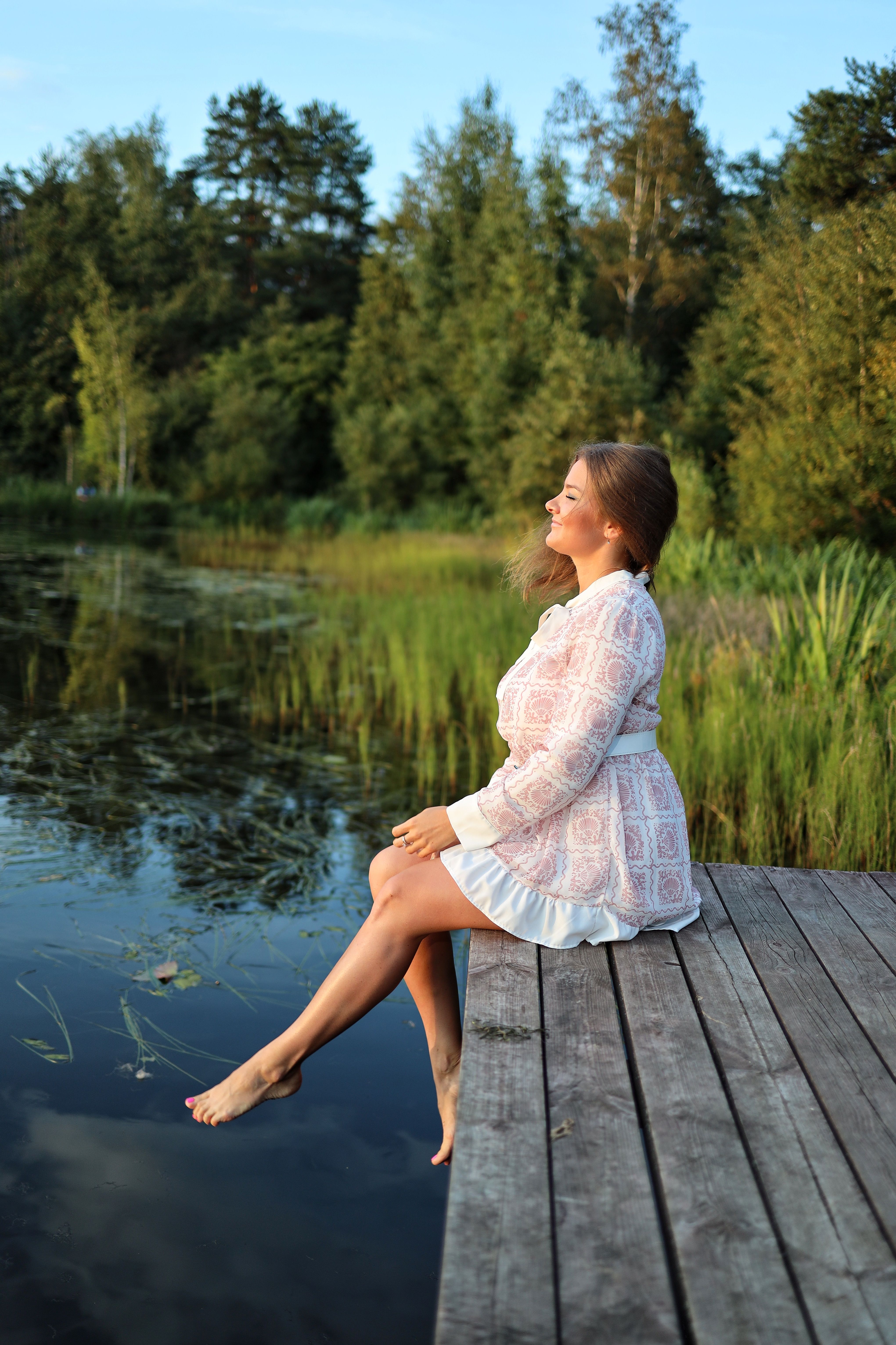 Women in Dresses Posing in Wilderness · Free Stock Photo