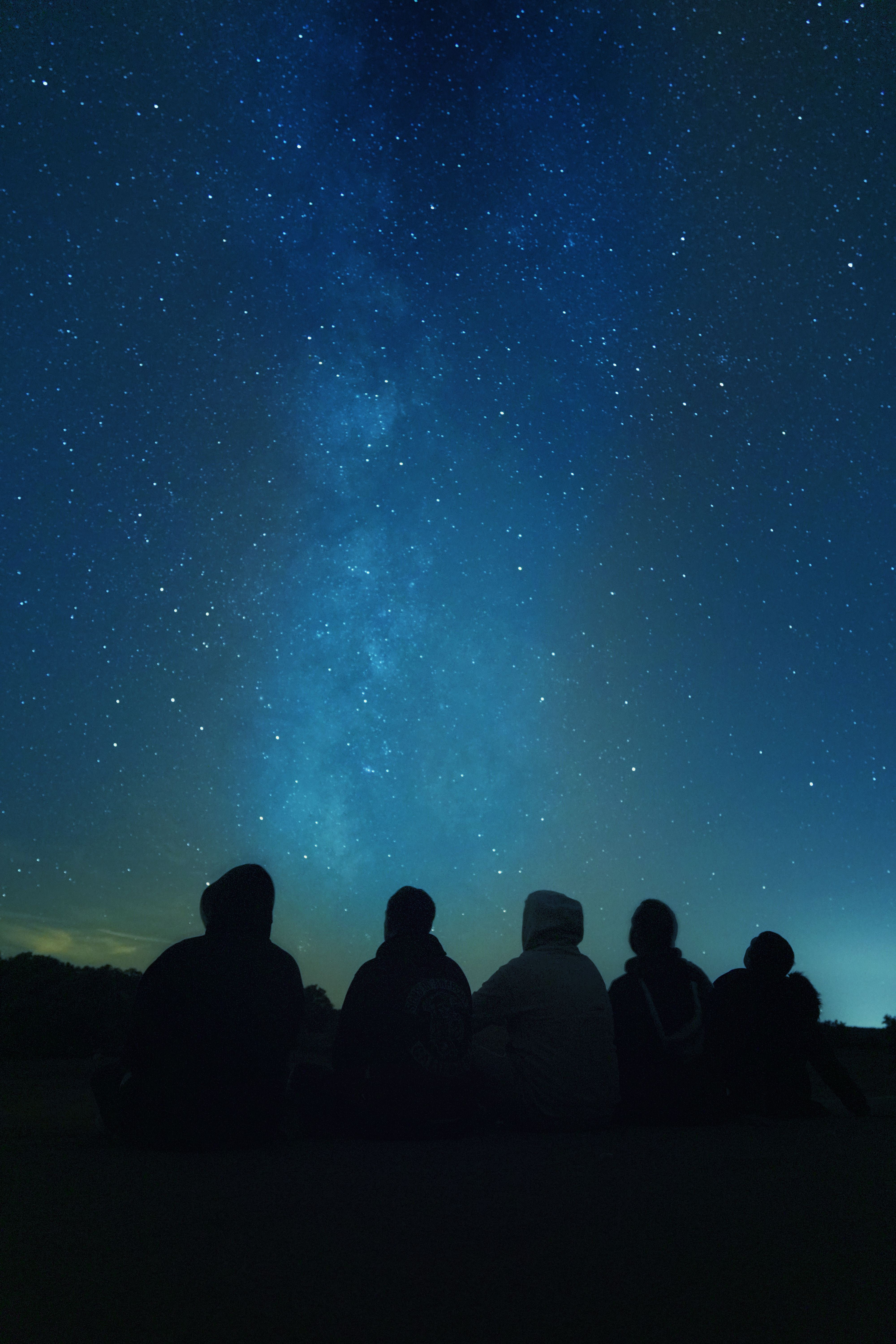 People Sitting and Watching the Night Sky · Free Stock Photo