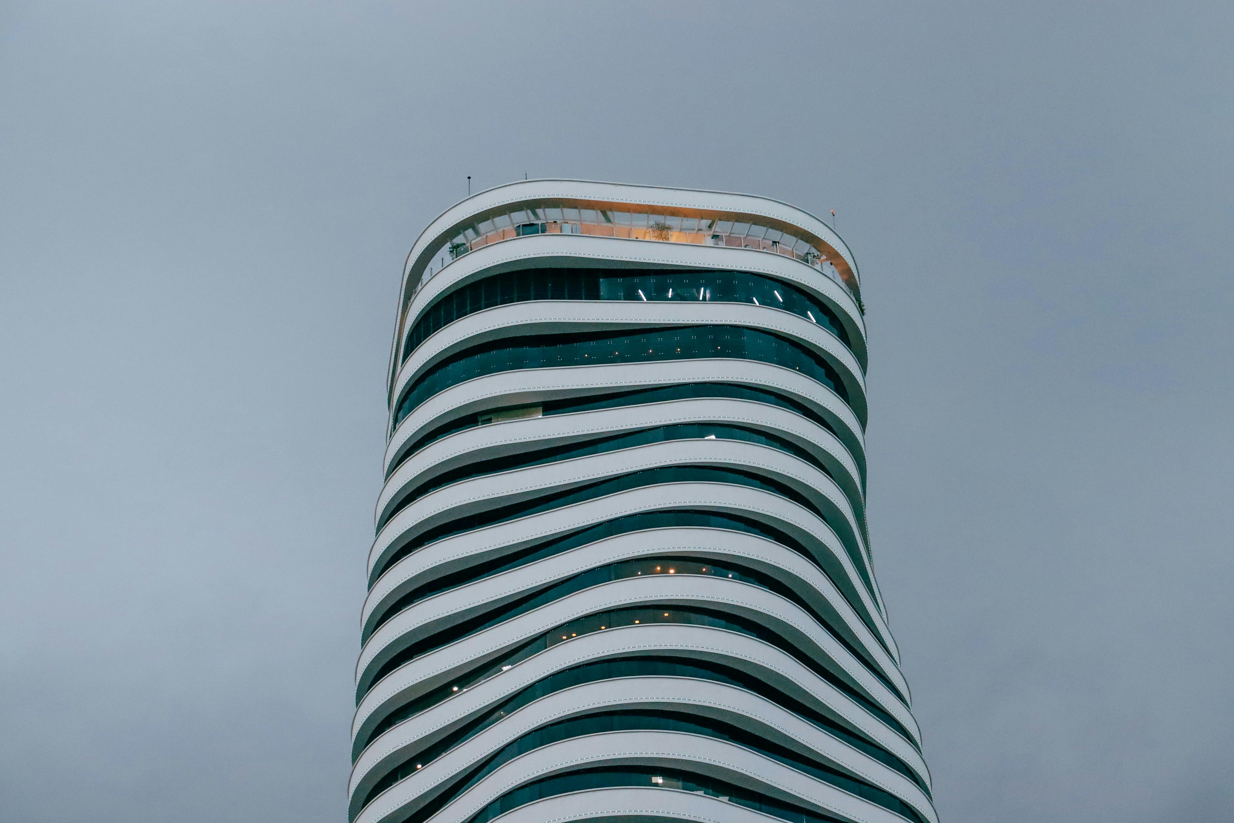 Modern, Bent Skyscraper · Free Stock Photo