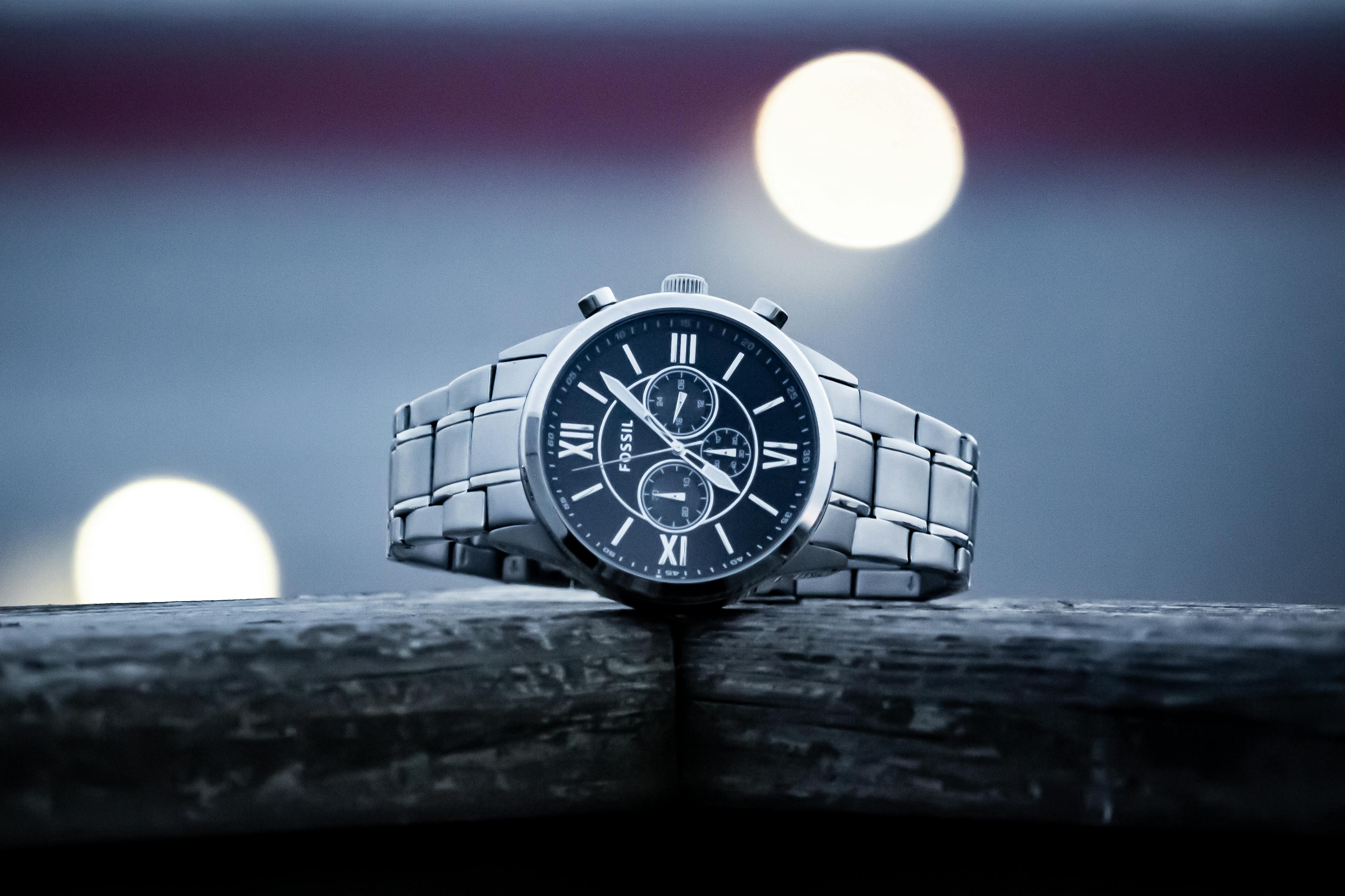 Round Silver-colored Watch on Table · Free Stock Photo