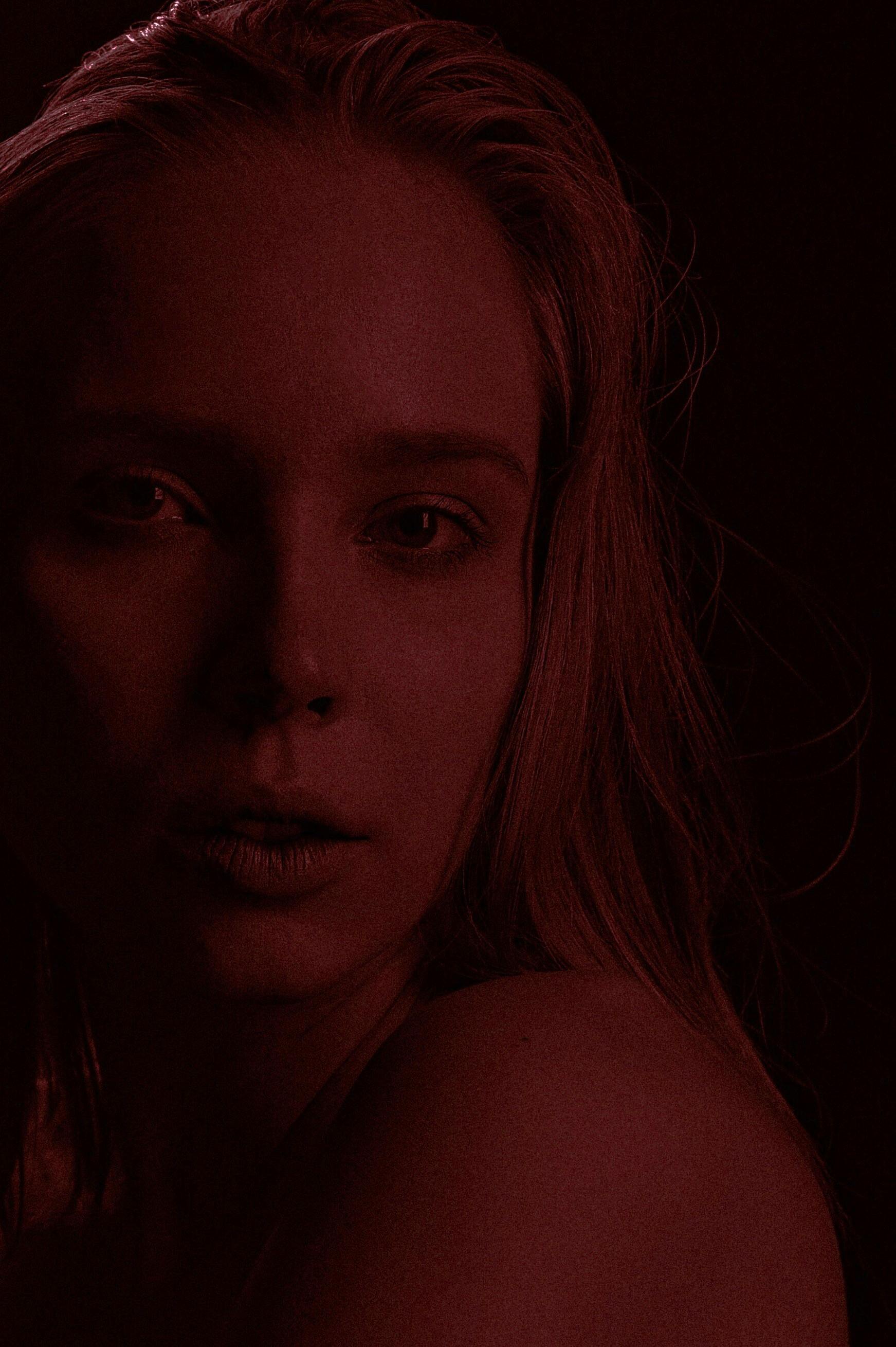 Portrait of Woman Under Red Light · Free Stock Photo